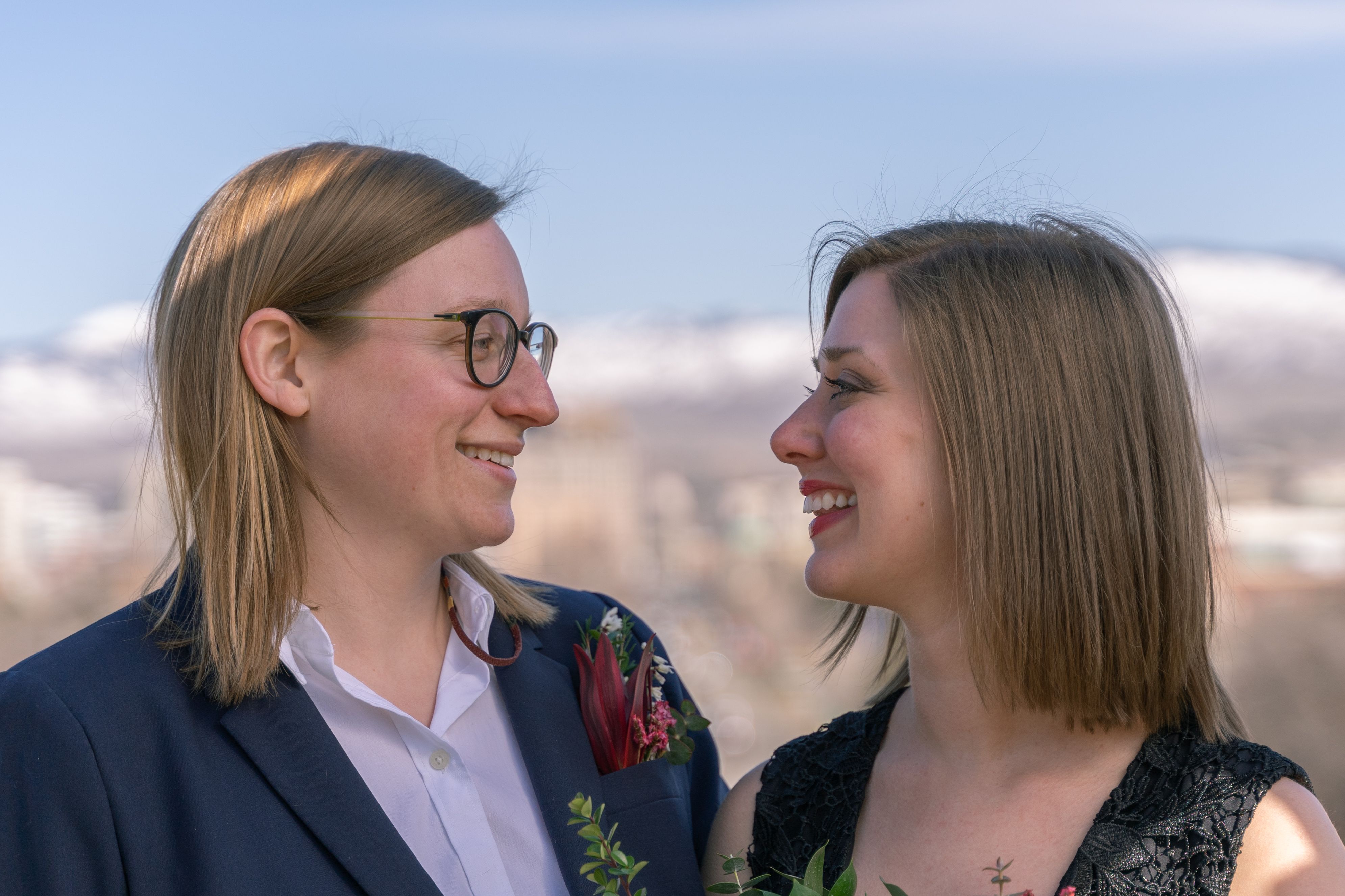 Two woman Leaning on Eachother · Free Stock Photo