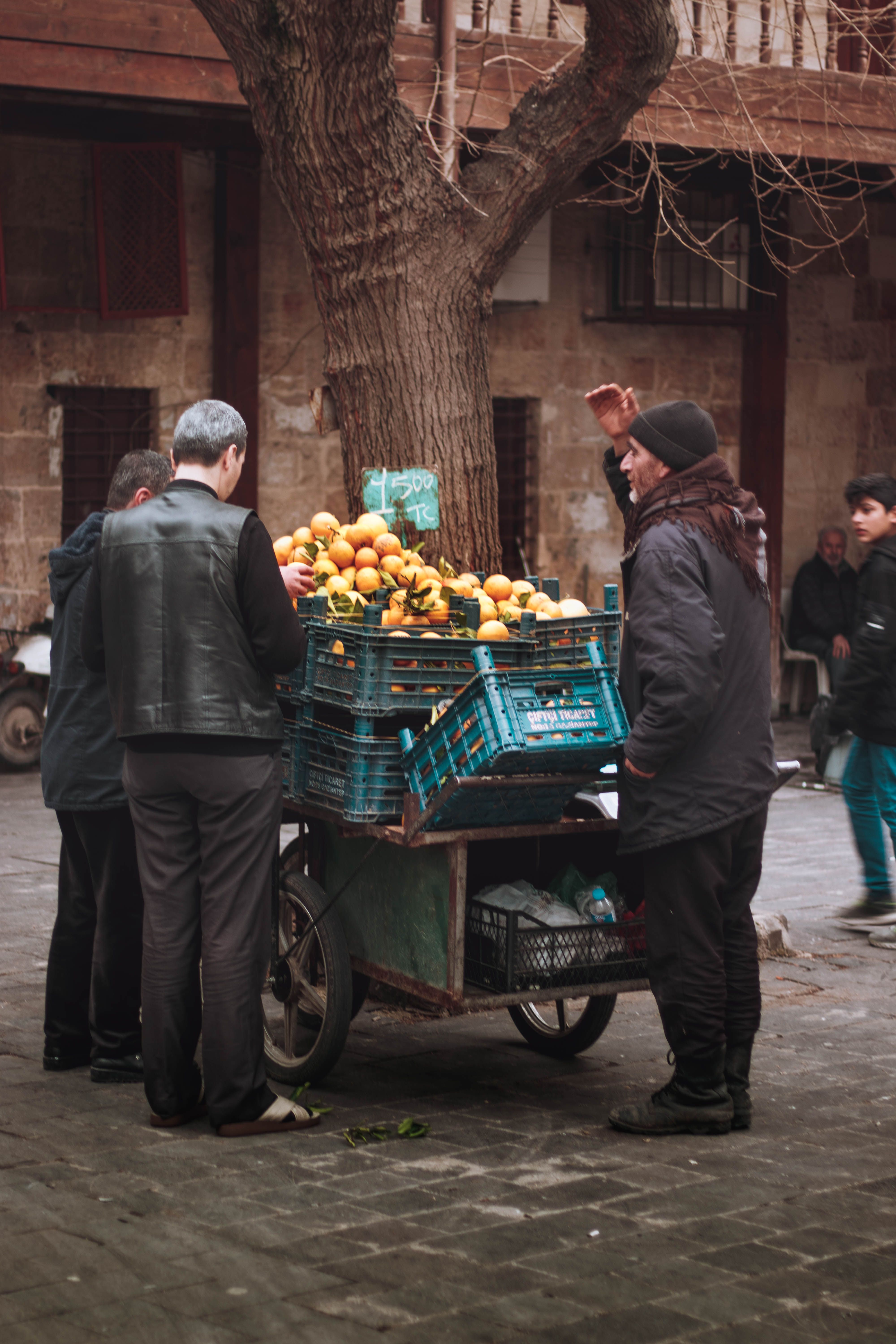 Old man selling fruits on street · Free Stock Photo