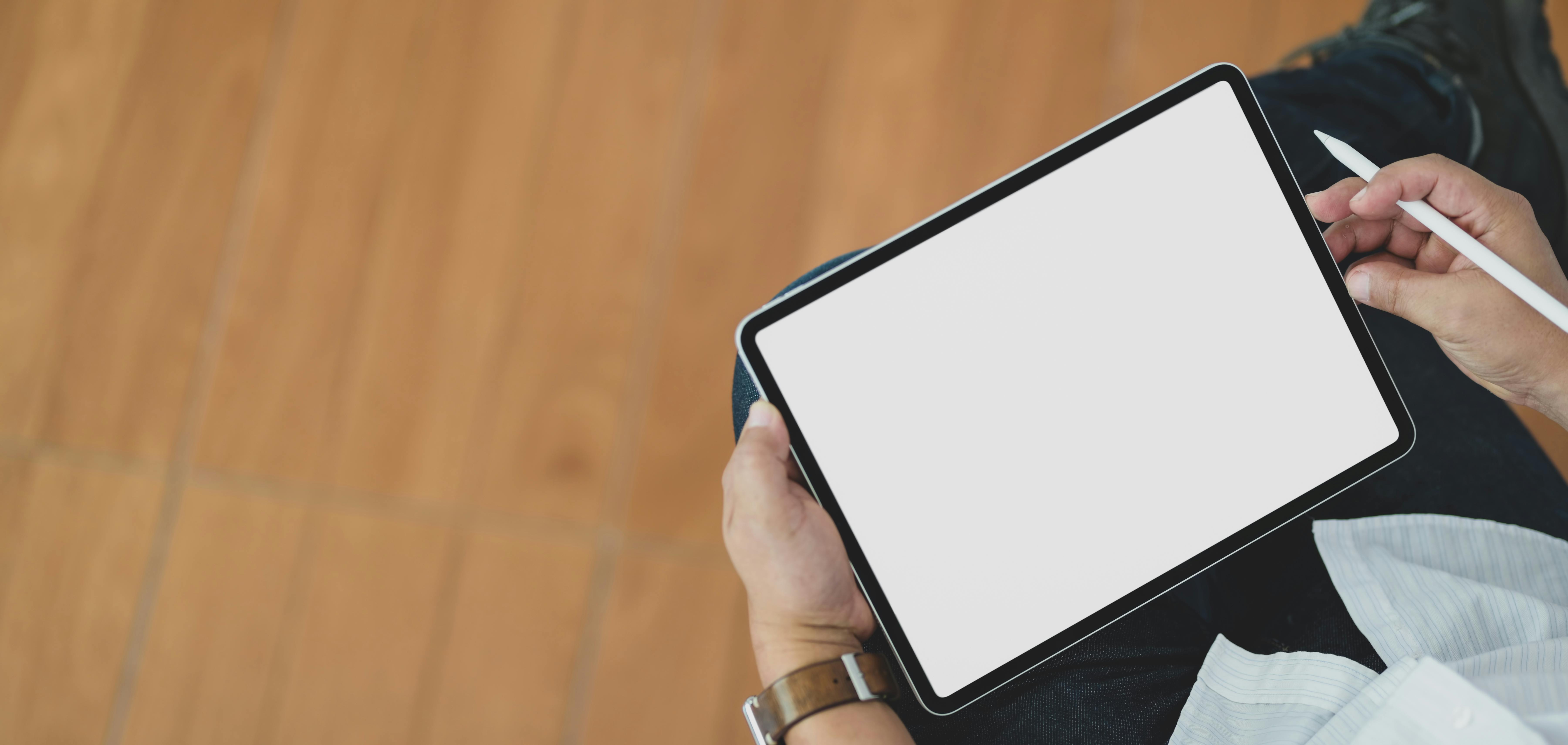 Person Holding Ipad · Free Stock Photo