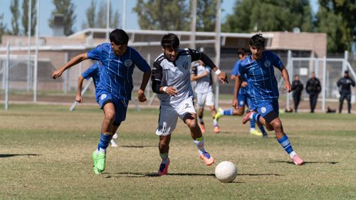 Young Athletes Competing in Intense Soccer Match · Free Stock Photo