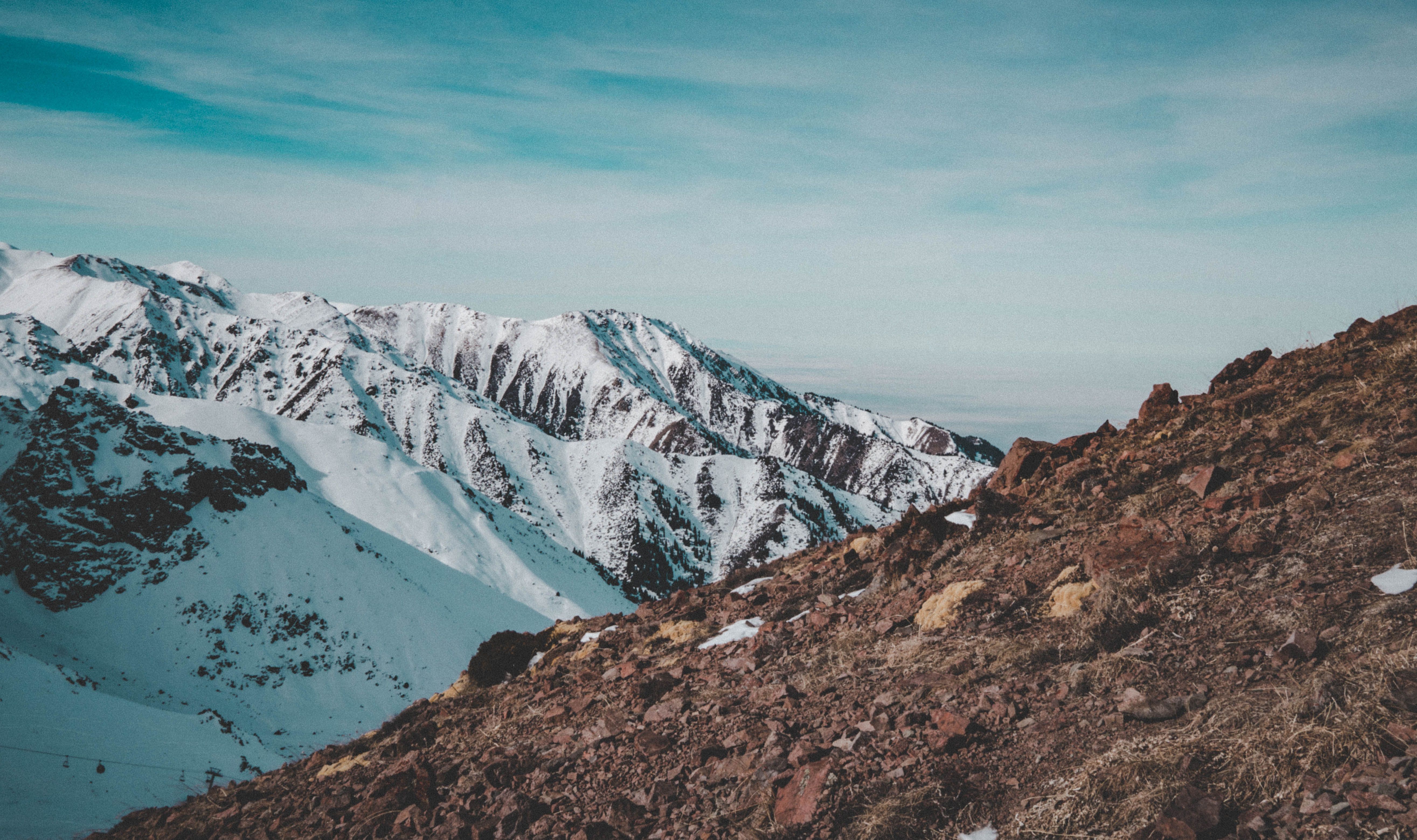Bird Flying Over Snow Covered Mountain · Free Stock Photo