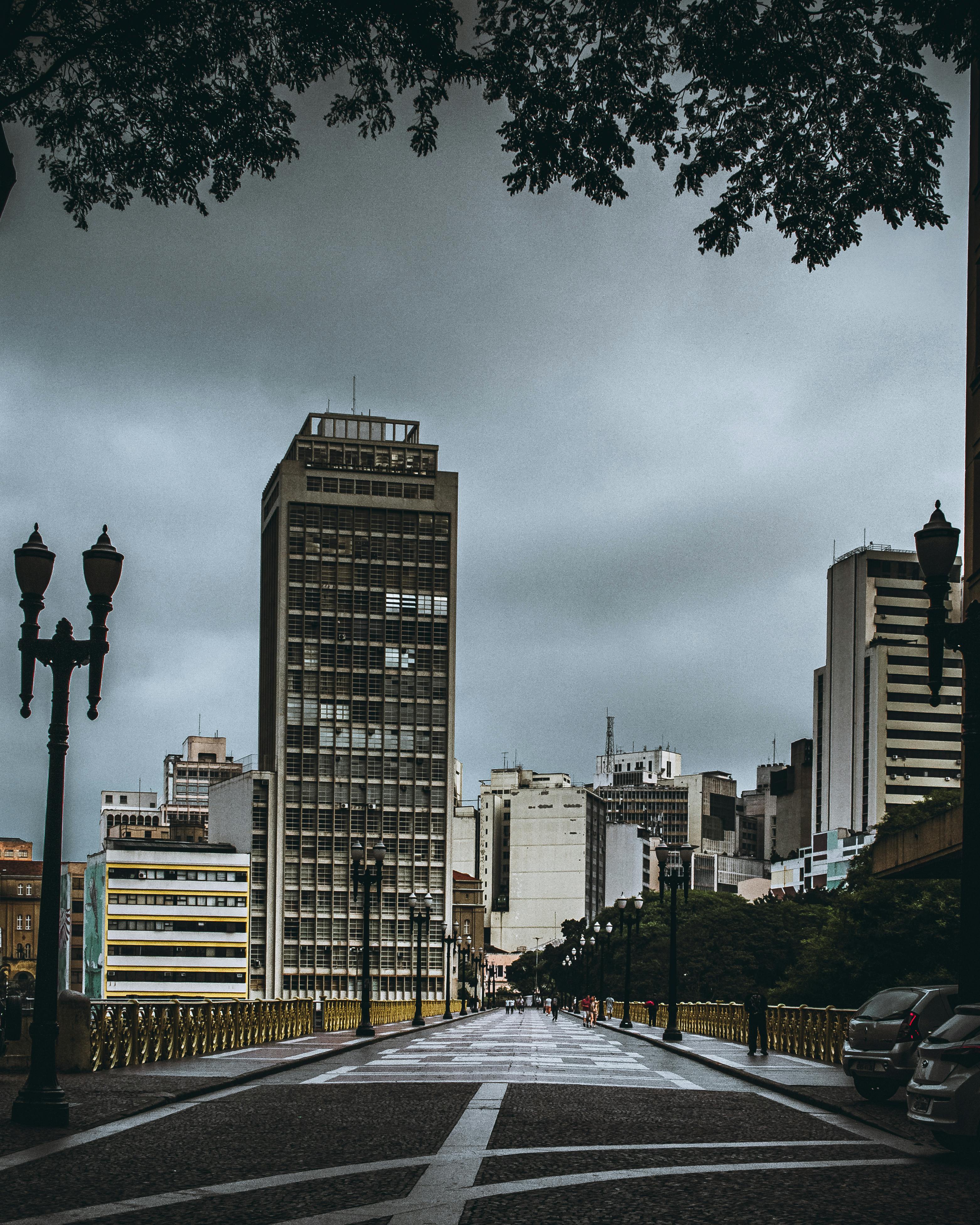 Modern city street with skyscrapers · Free Stock Photo