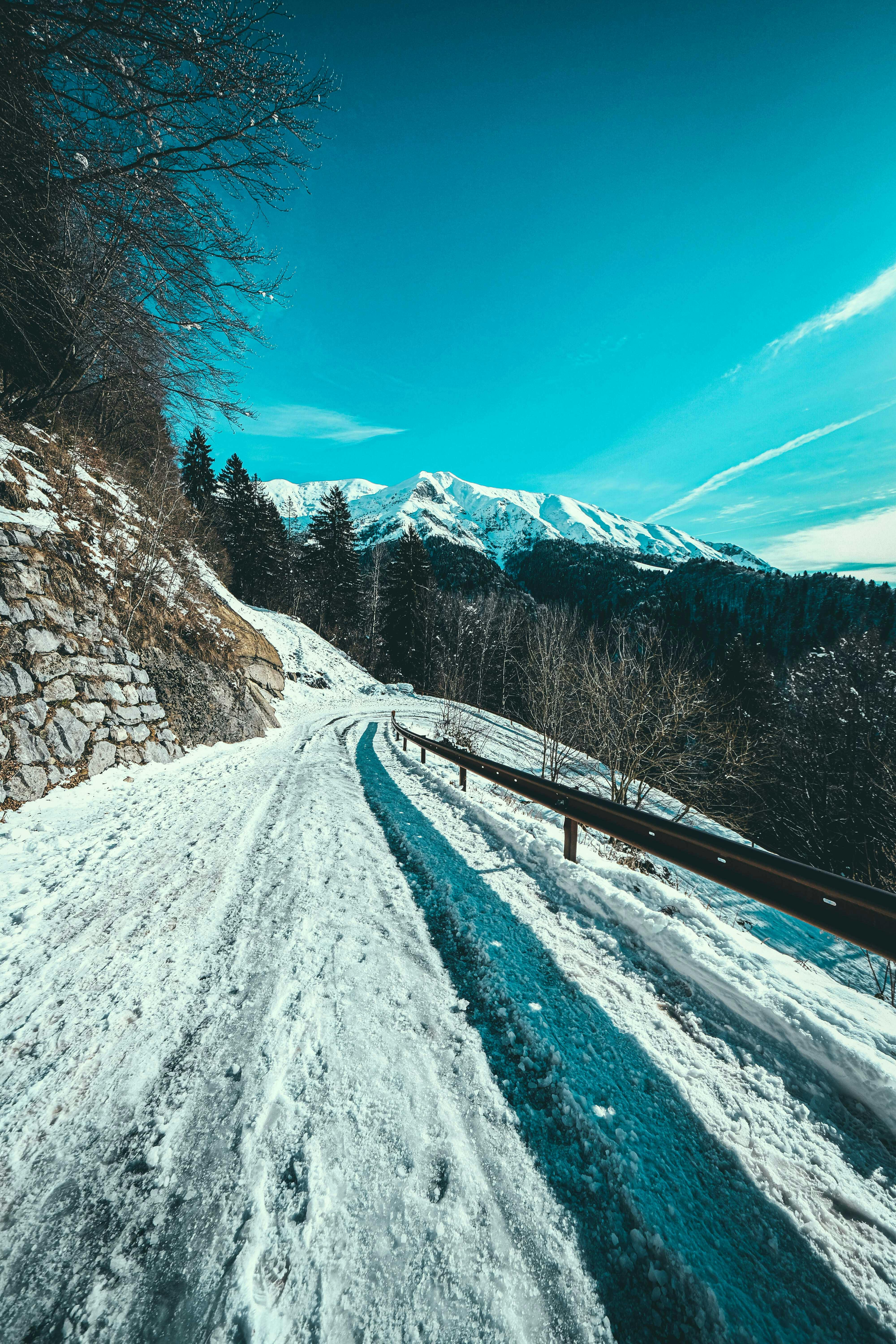 Snow Covered Road Under Blue Sky · Free Stock Photo