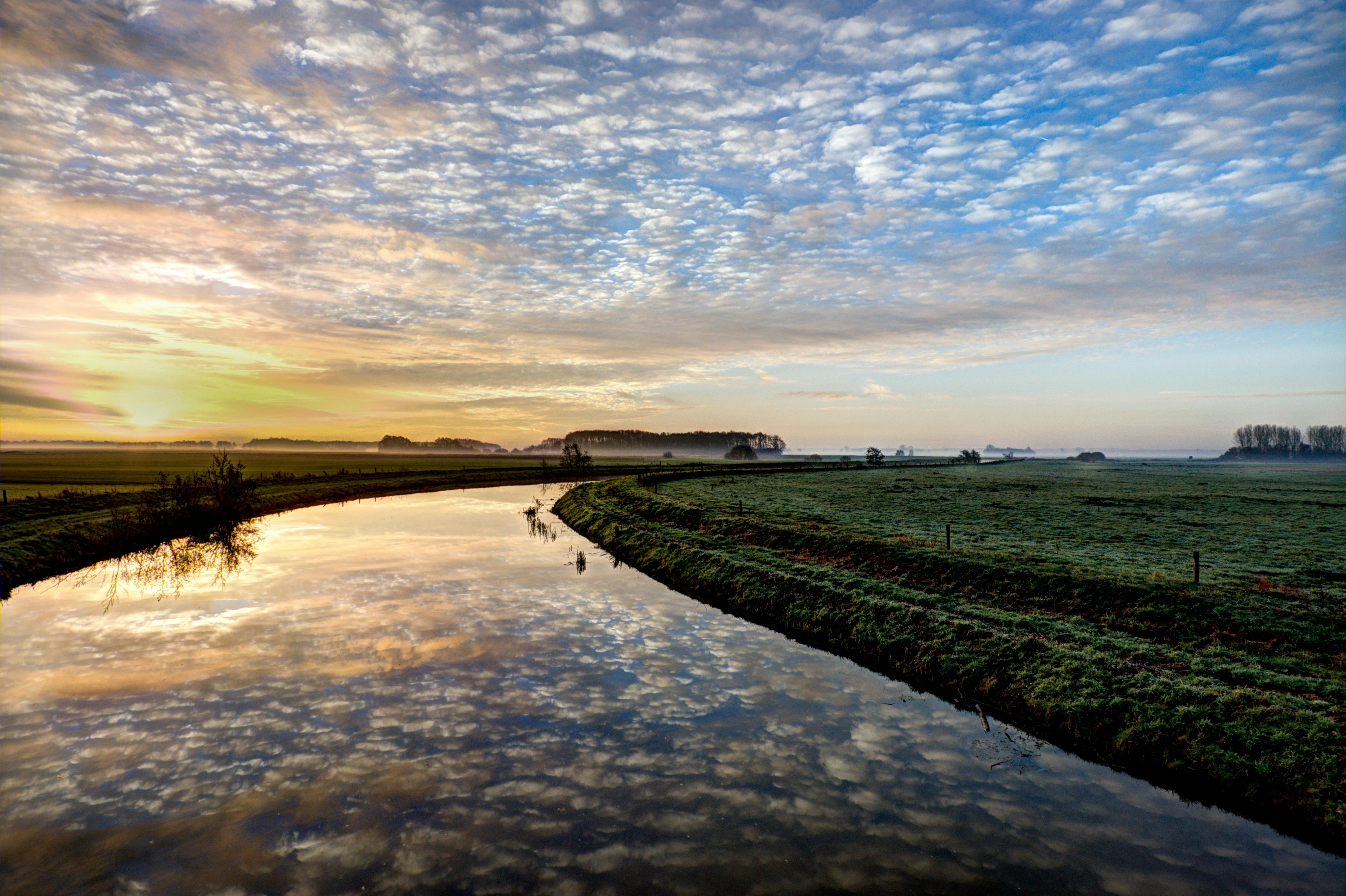 Cirrus Clouds Reflecting on River · Free Stock Photo