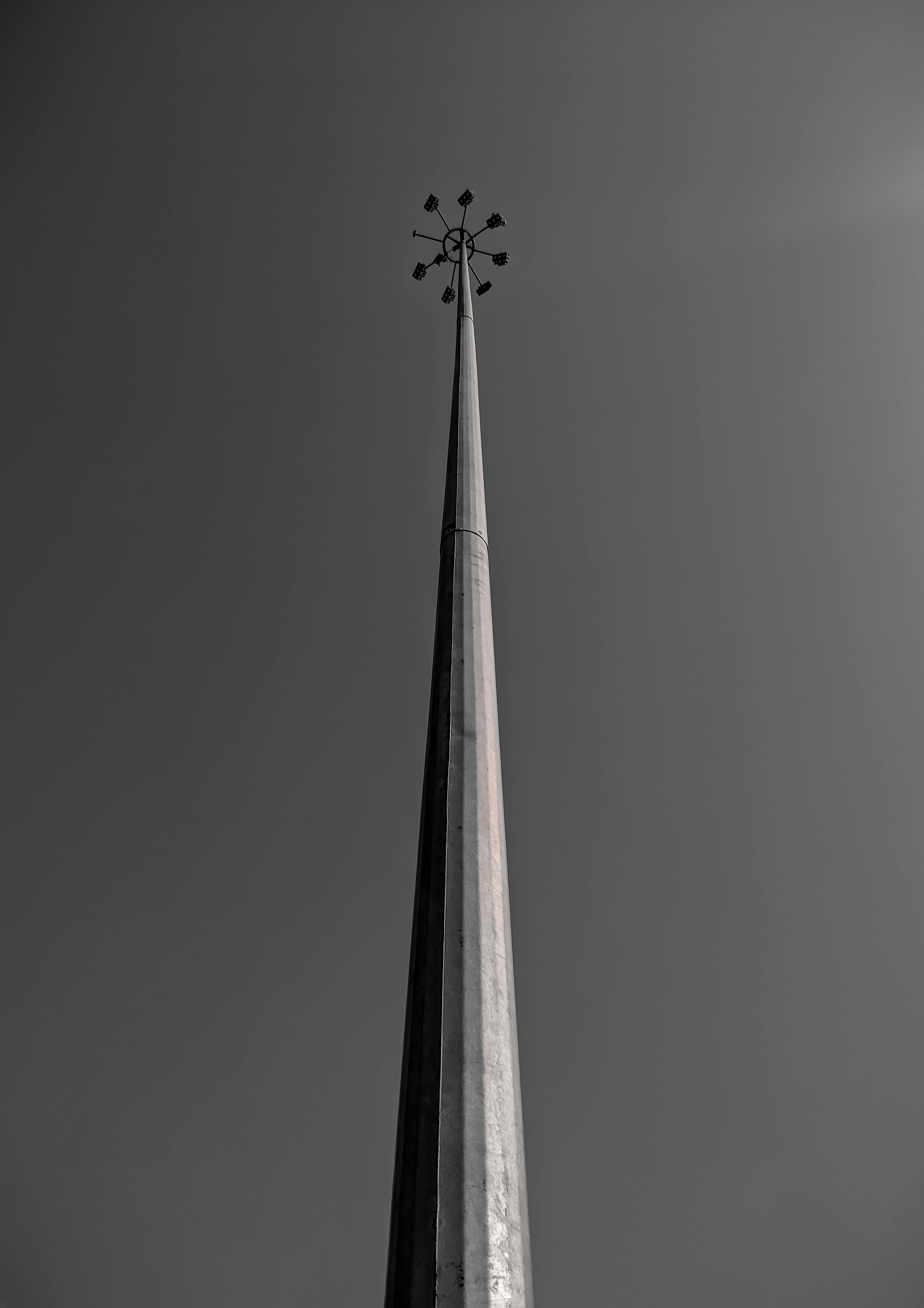 Gray scale Photo of Low Angle View of Gray Tower · Free Stock Photo