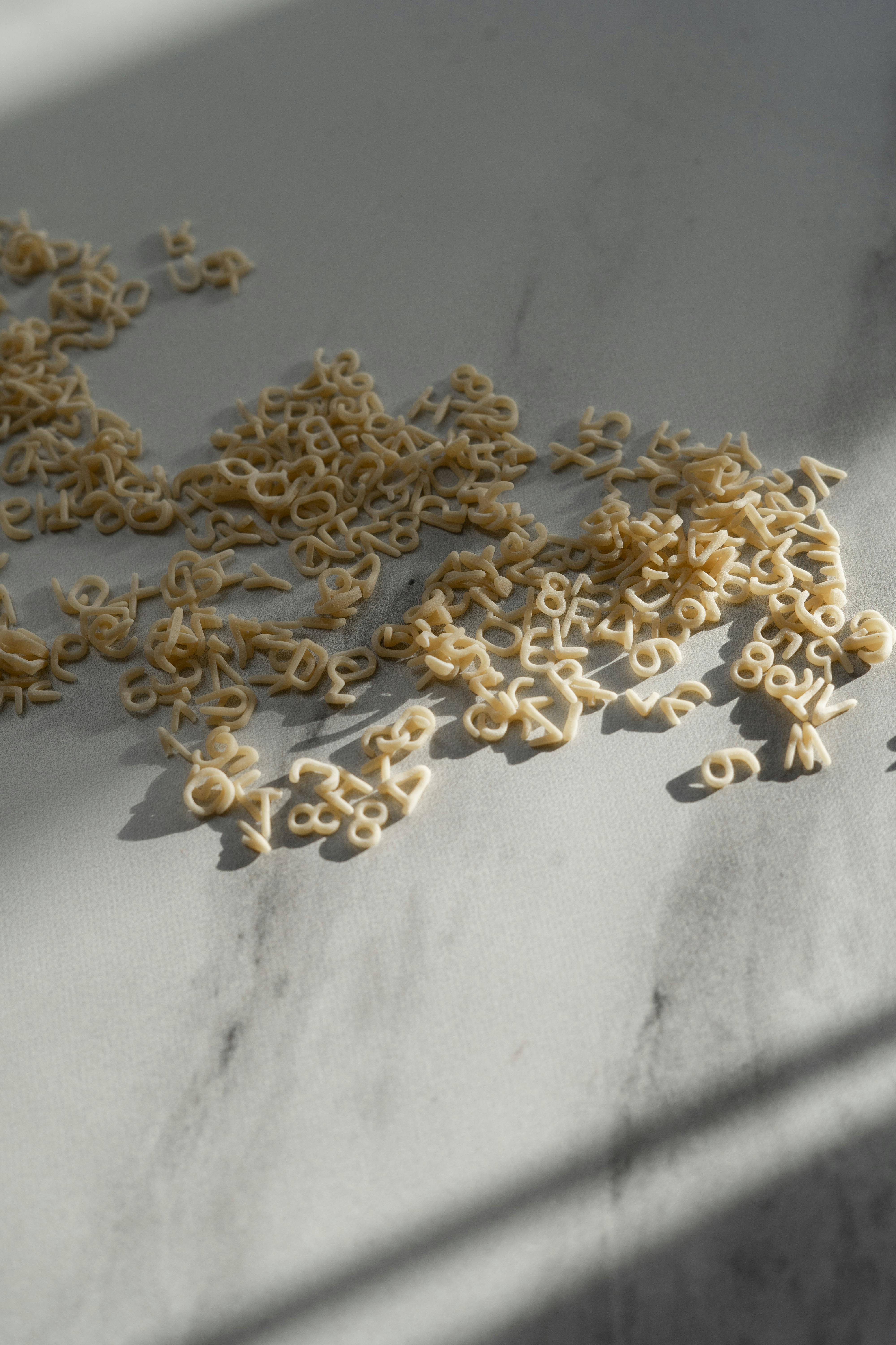 Pasta Numbers on Marble Surface · Free Stock Photo