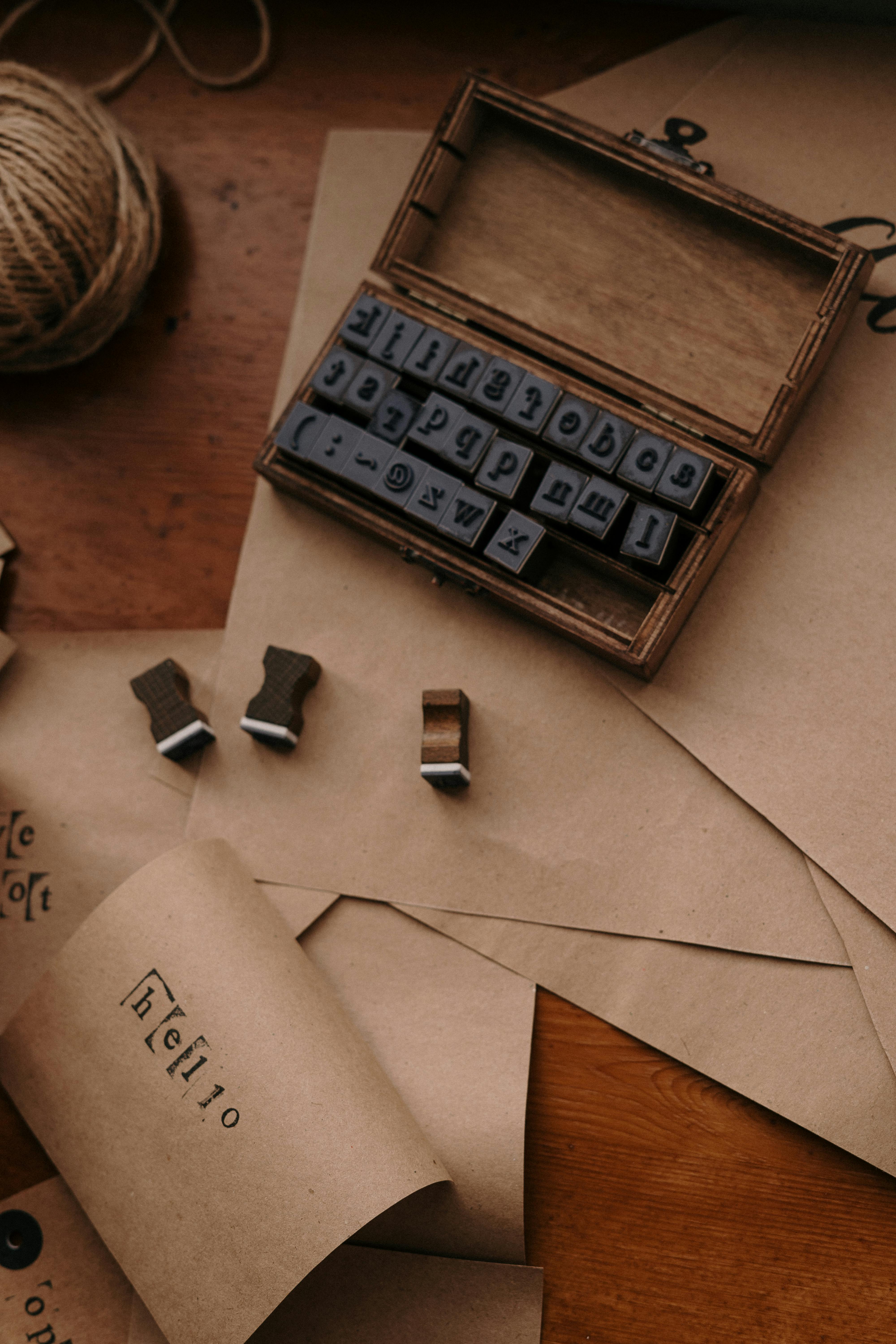 Stamped Letters on Brown Paper · Free Stock Photo