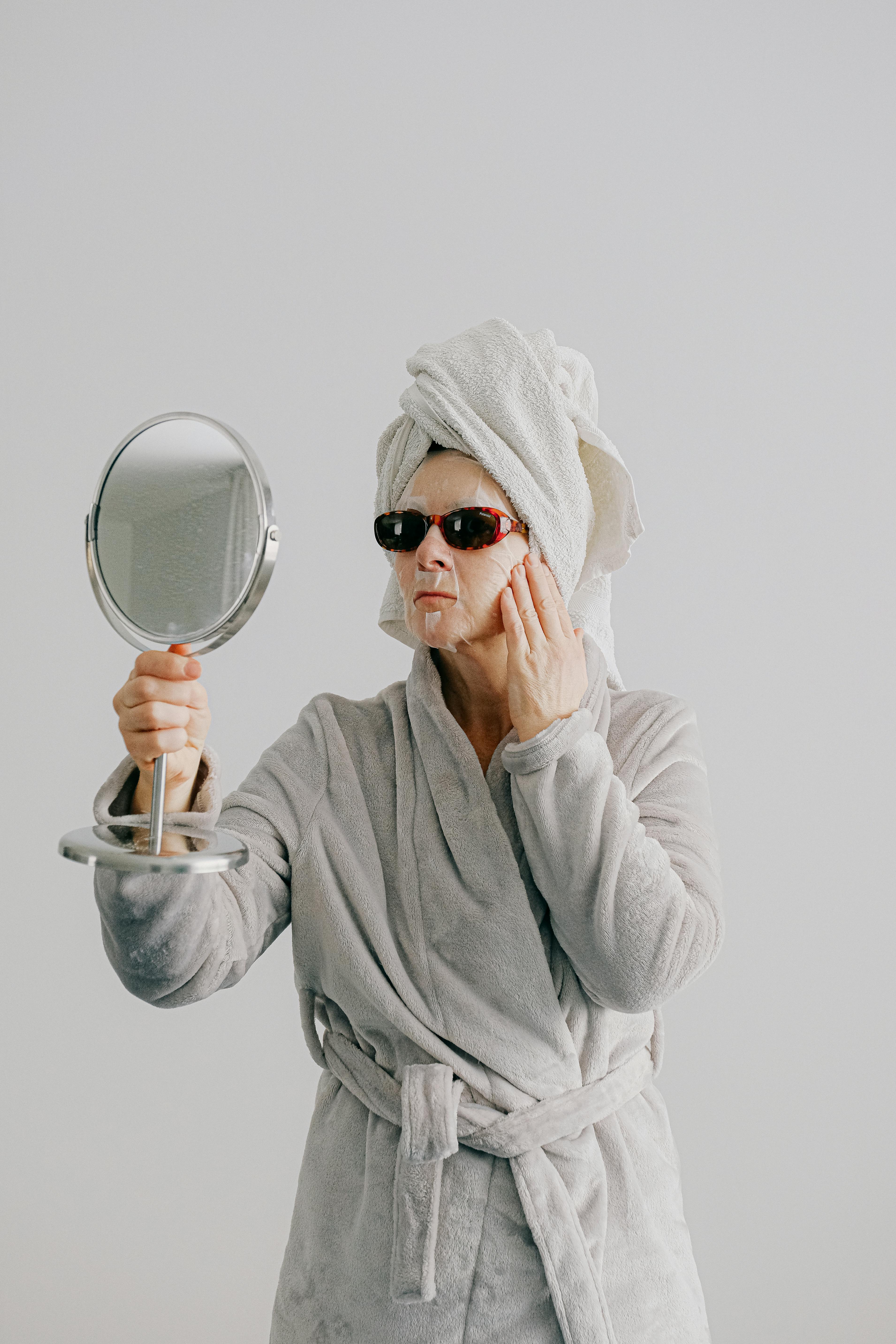 Woman In Gray Robe · Free Stock Photo