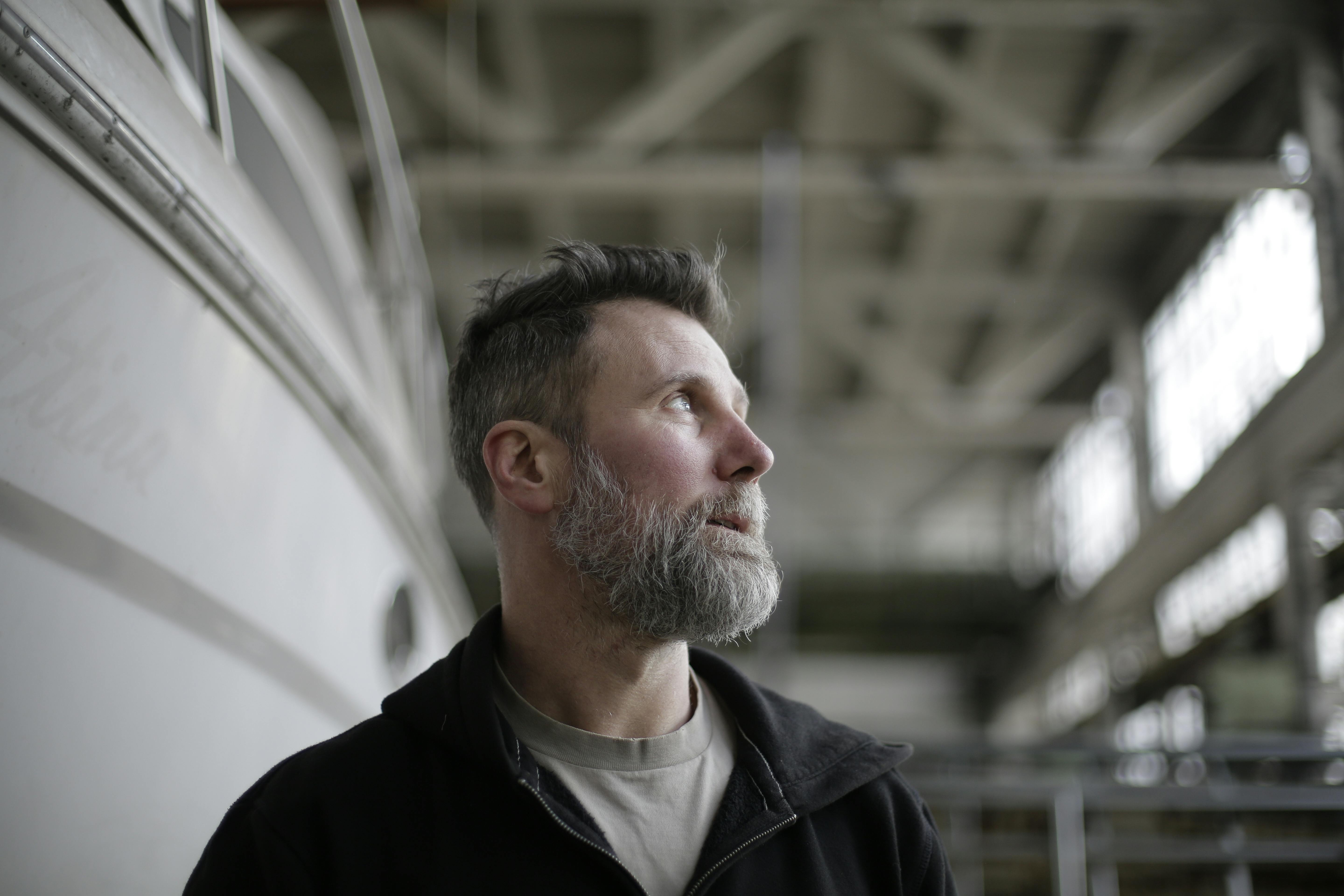 Anonymous worker in heavy duty gloves · Free Stock Photo