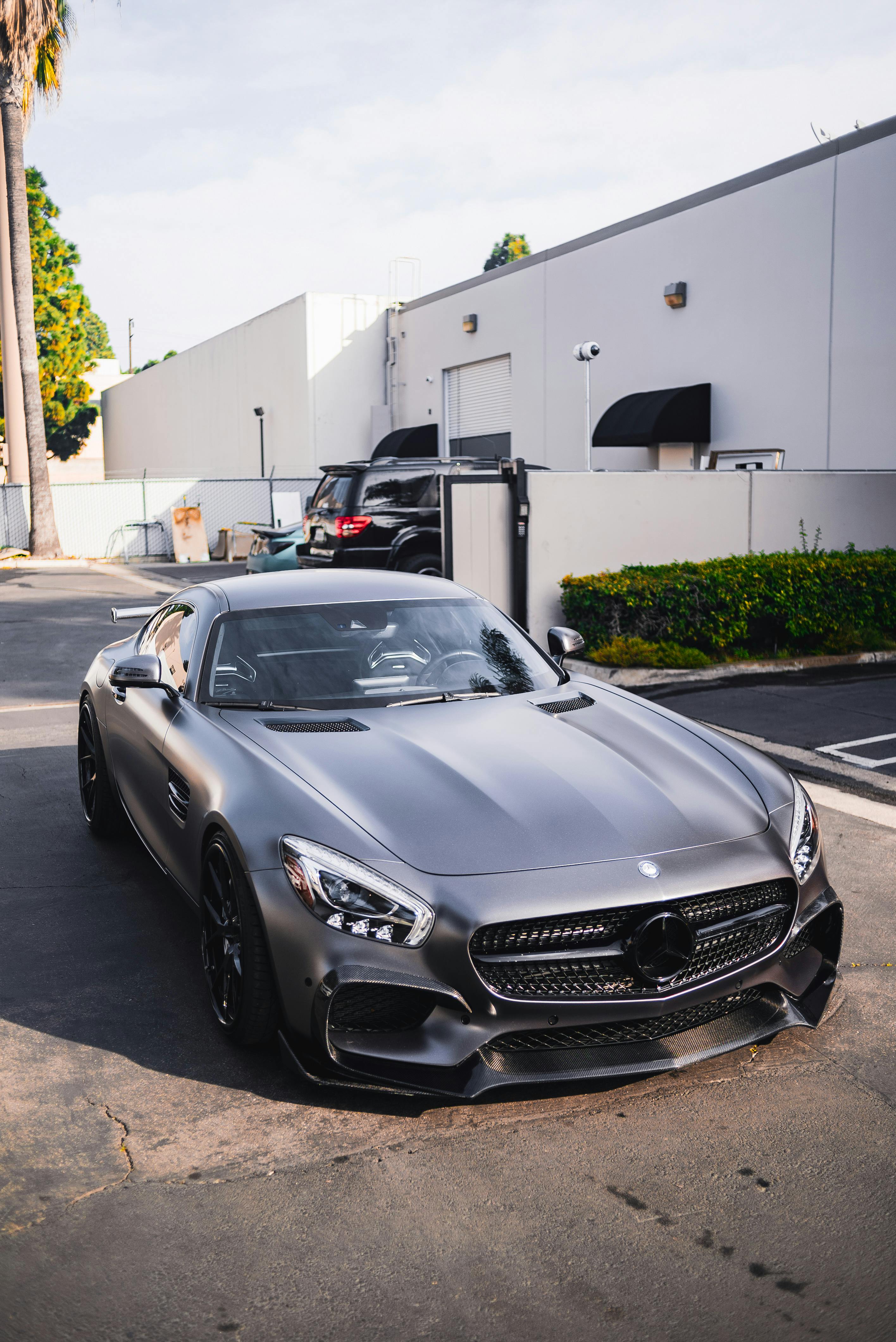 A Sports Car Parked on the Street · Free Stock Photo