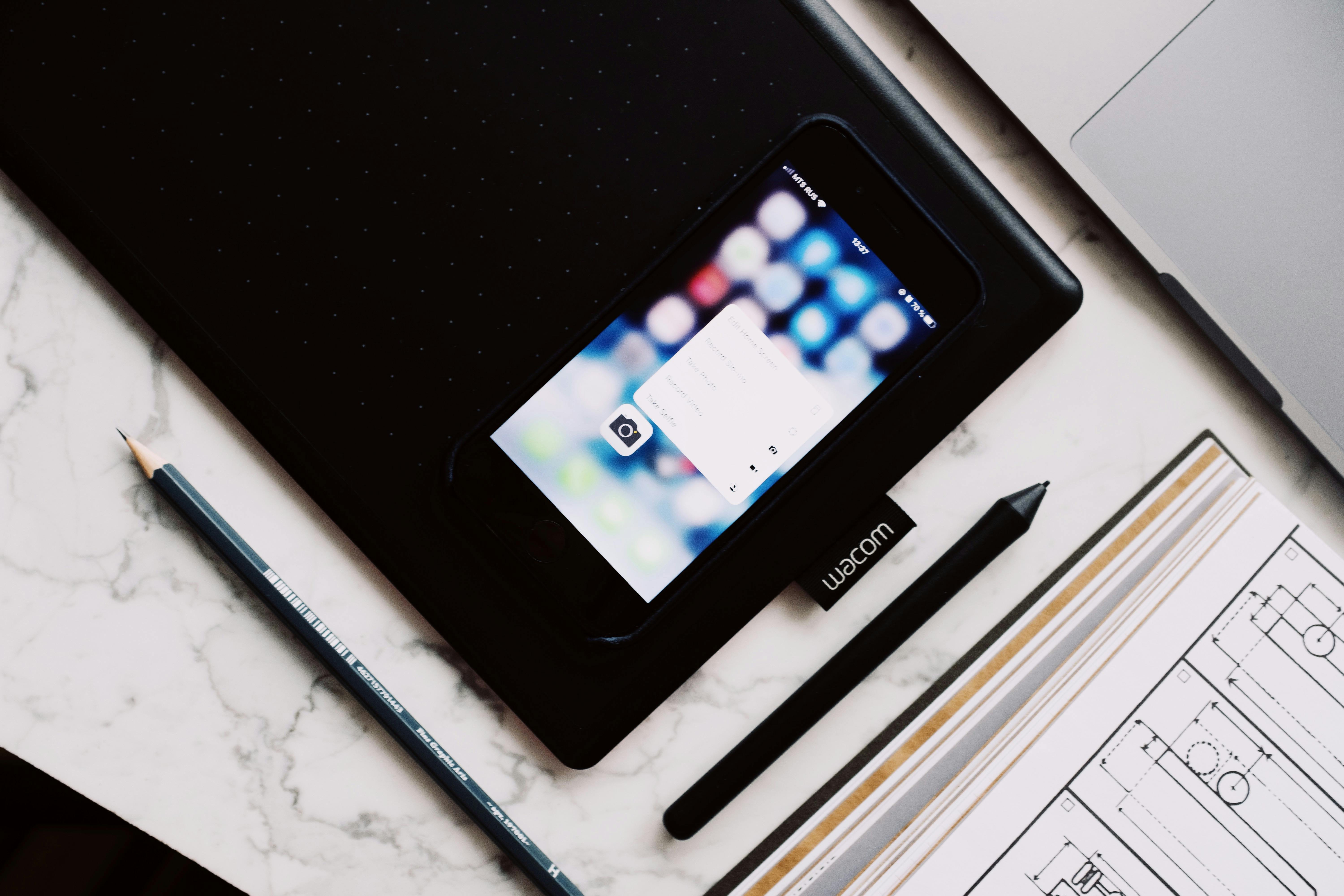 Mobile Phone on Top of Drawing Tablet · Free Stock Photo