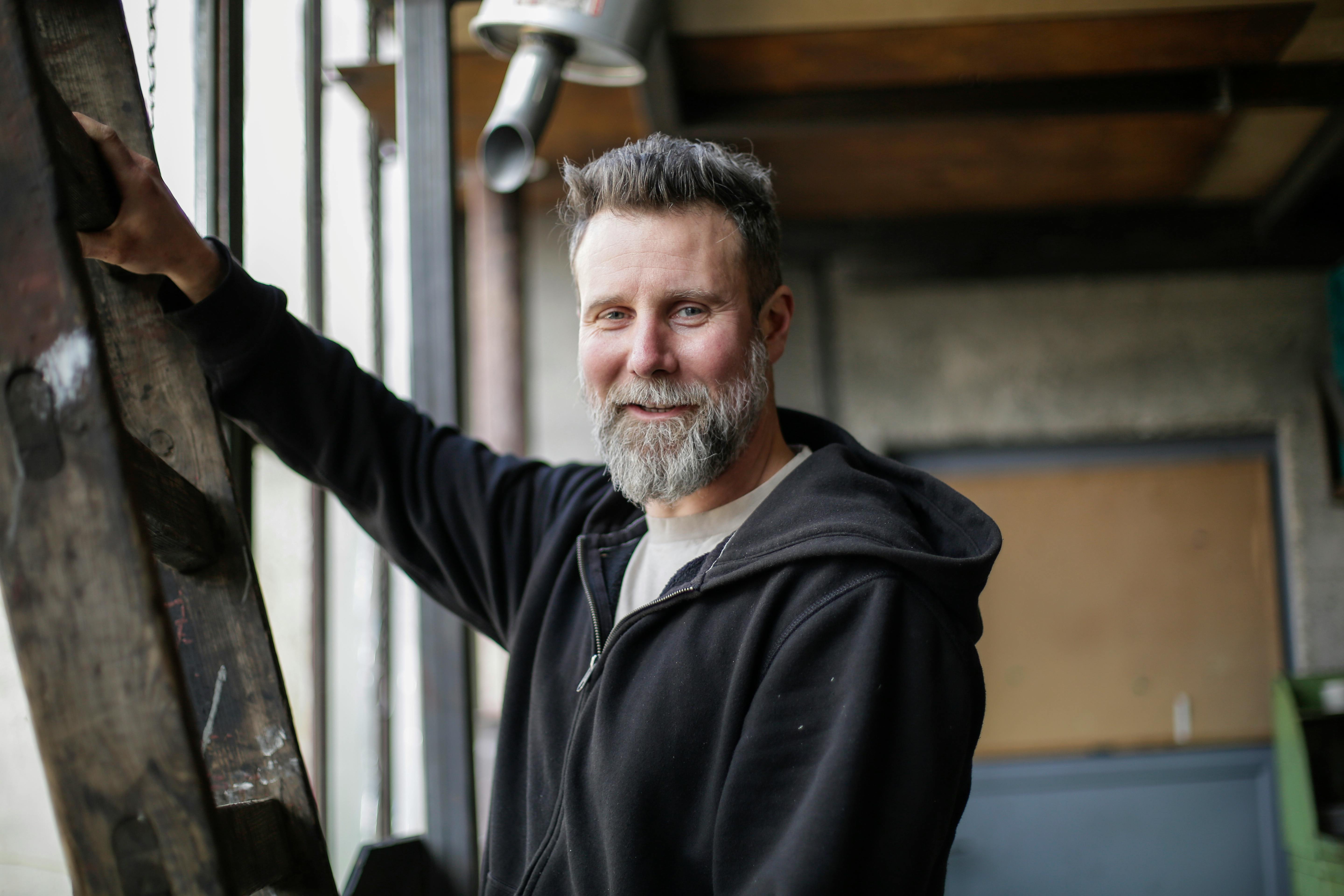 Portrait of Man Wearing Shell Choker Necklace · Free Stock Photo