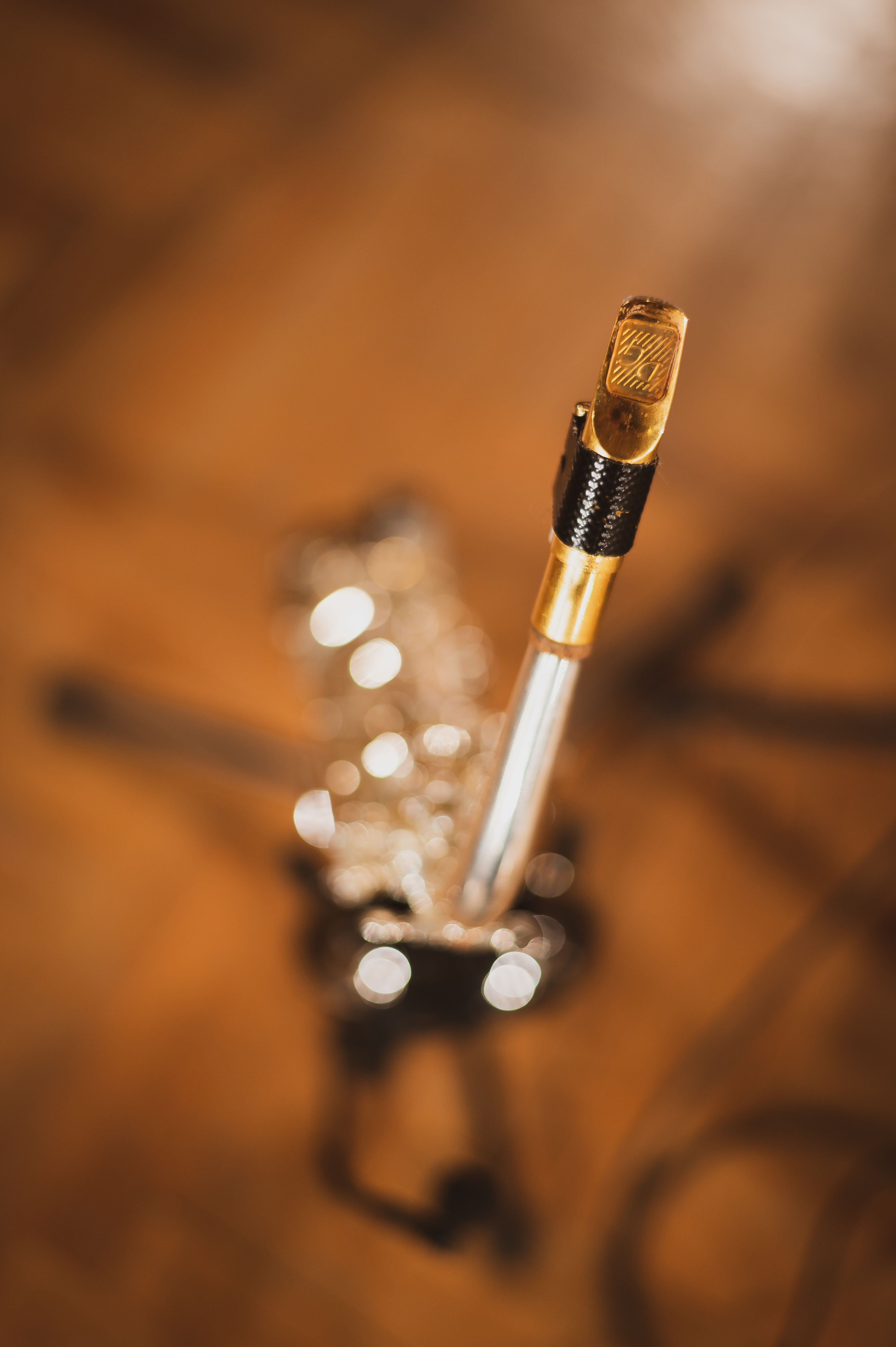 Brass Saxophone Mouthpiece in Close-up Photography · Free Stock Photo