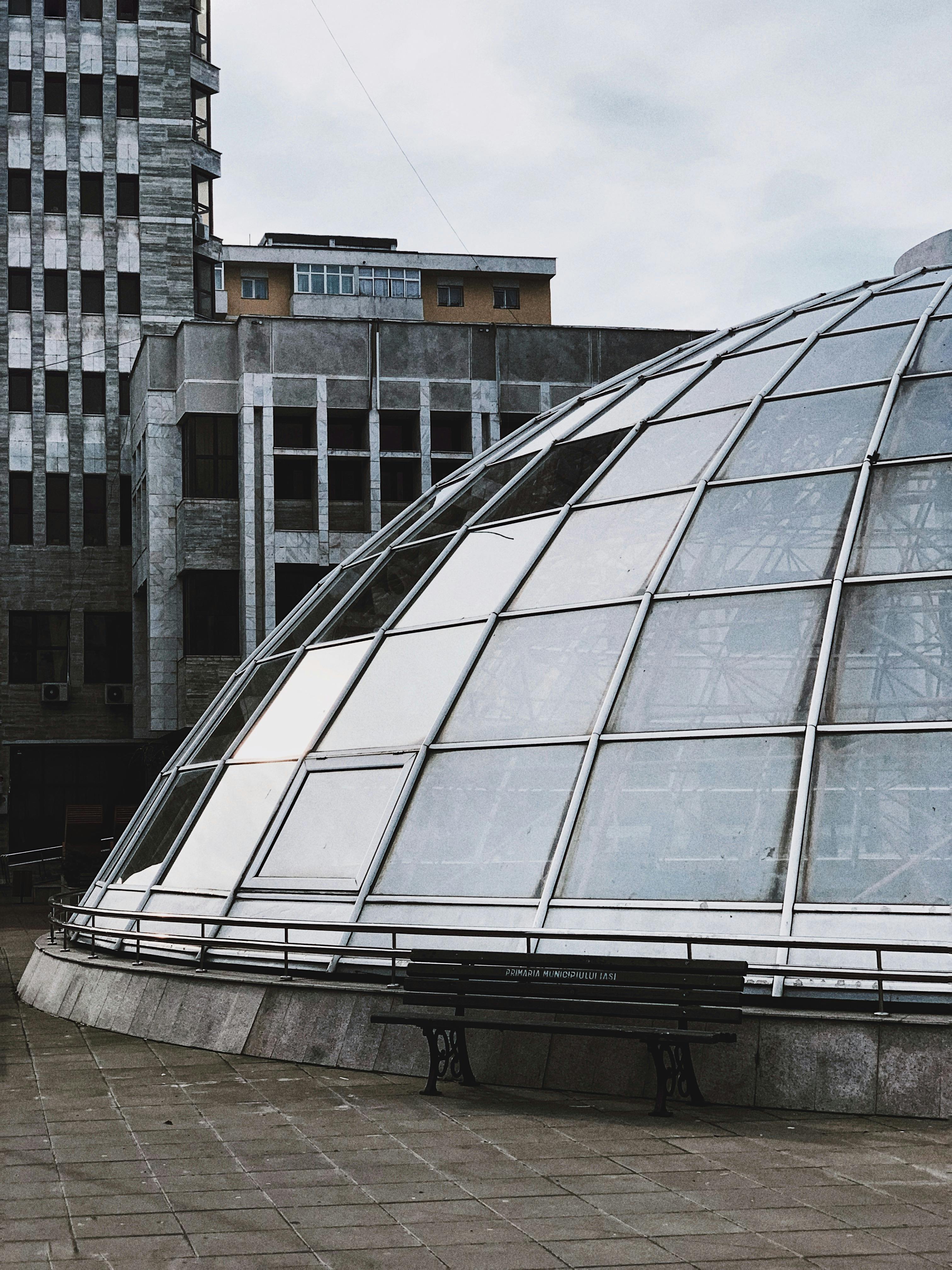 Modern building with geometric glass dome · Free Stock Photo