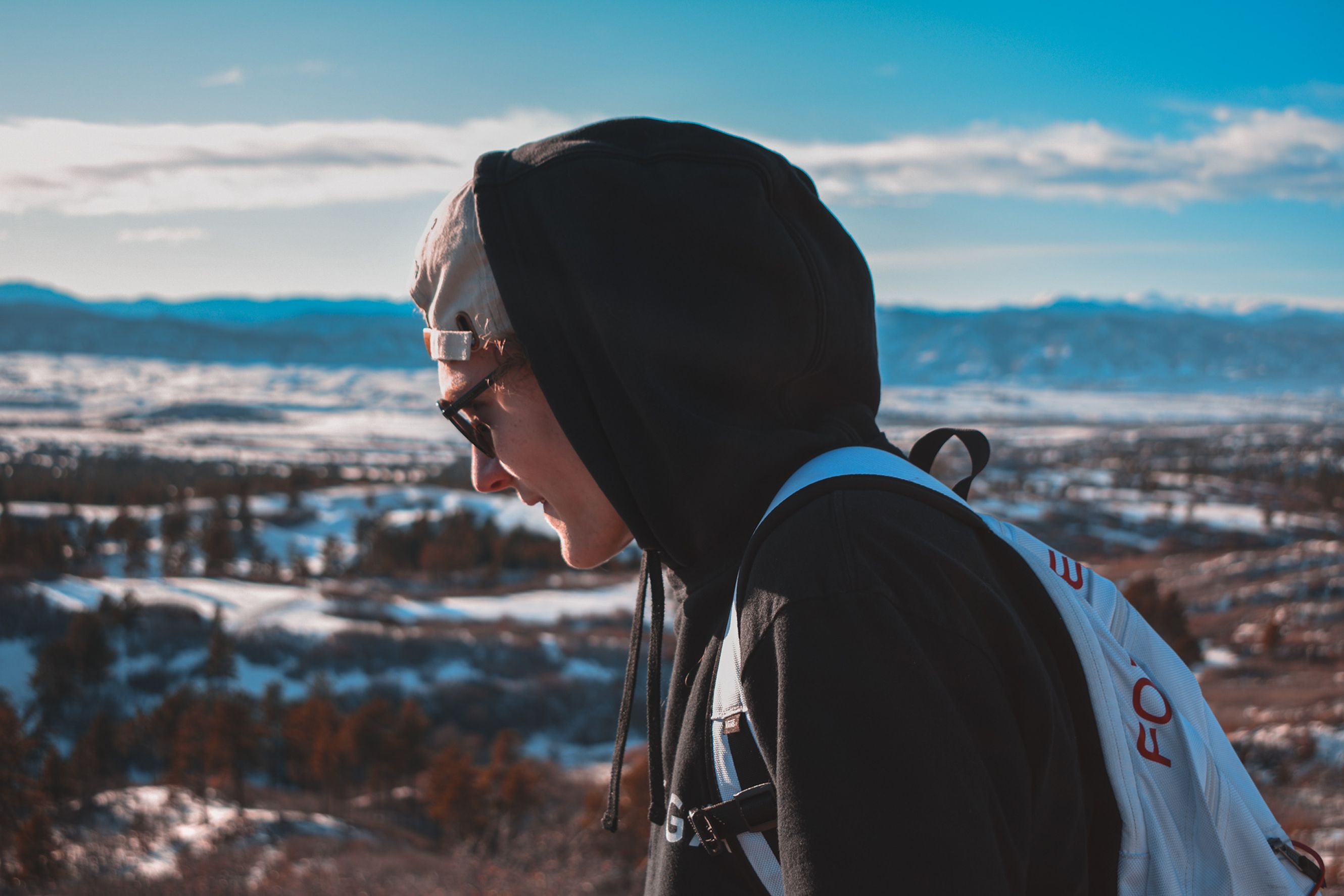 A Side View of a Man in Black Hoodie Sweater · Free Stock Photo