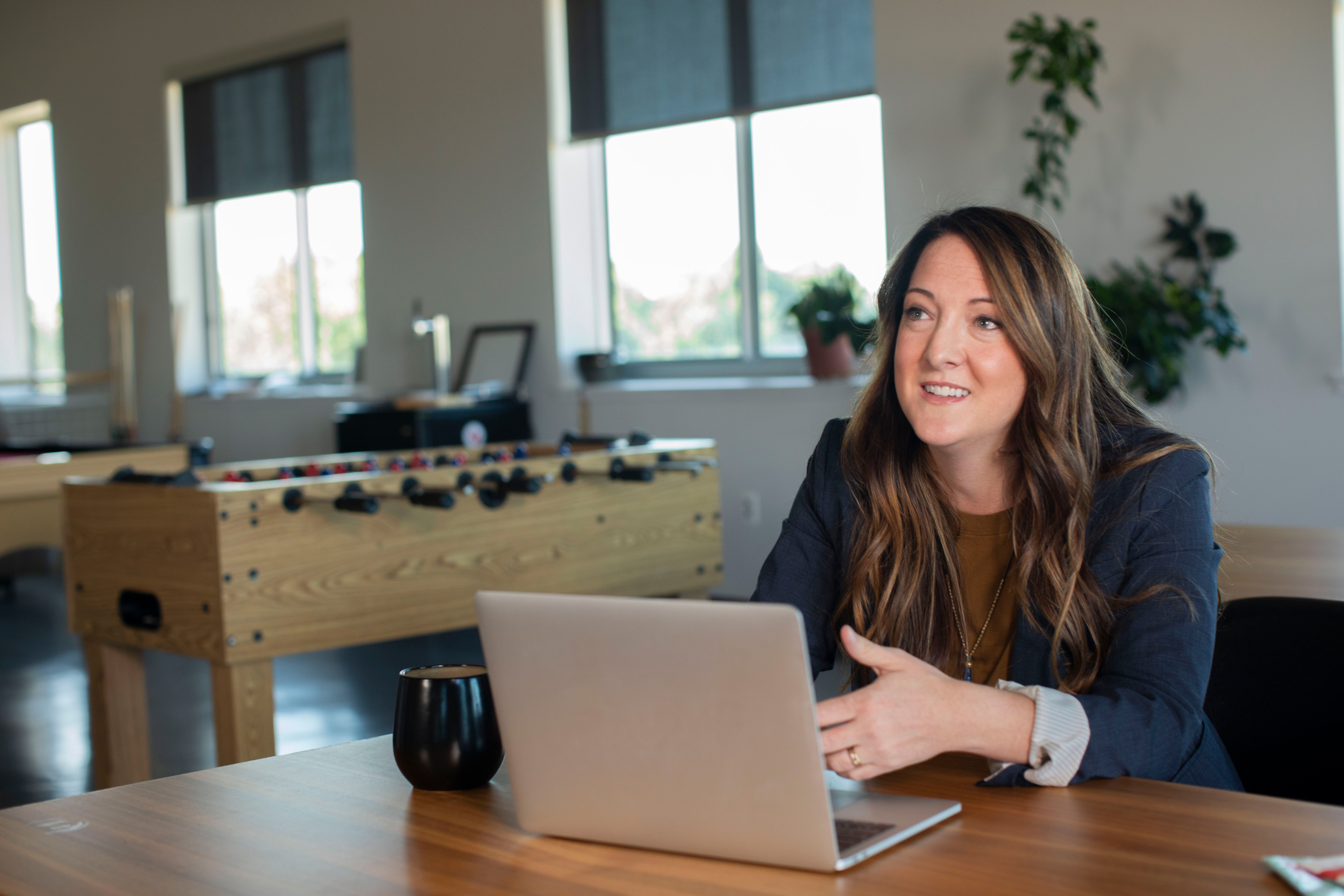 Woman Working on Computer in Office · Free Stock Photo
