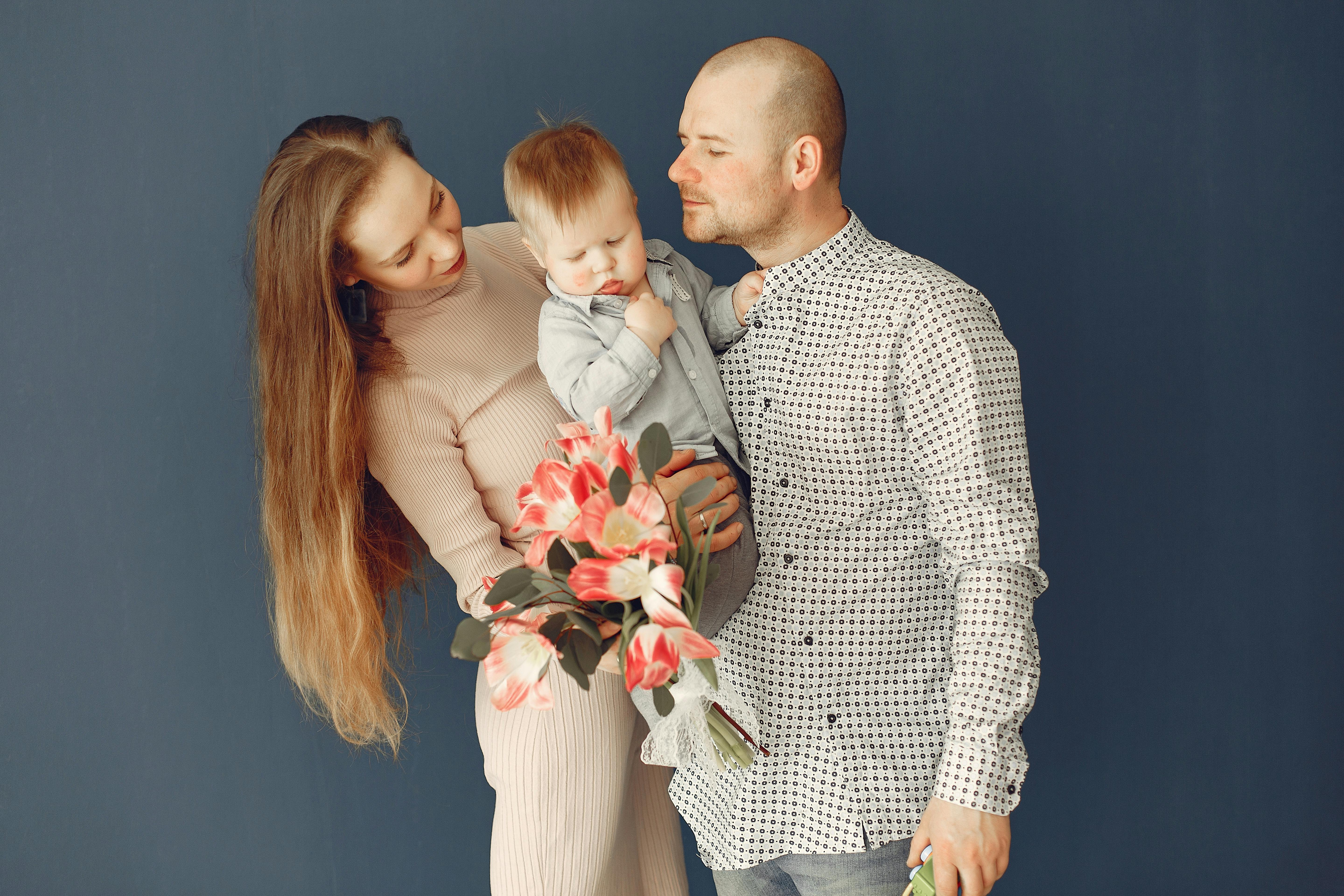 Man Carrying A Little Boy · Free Stock Photo
