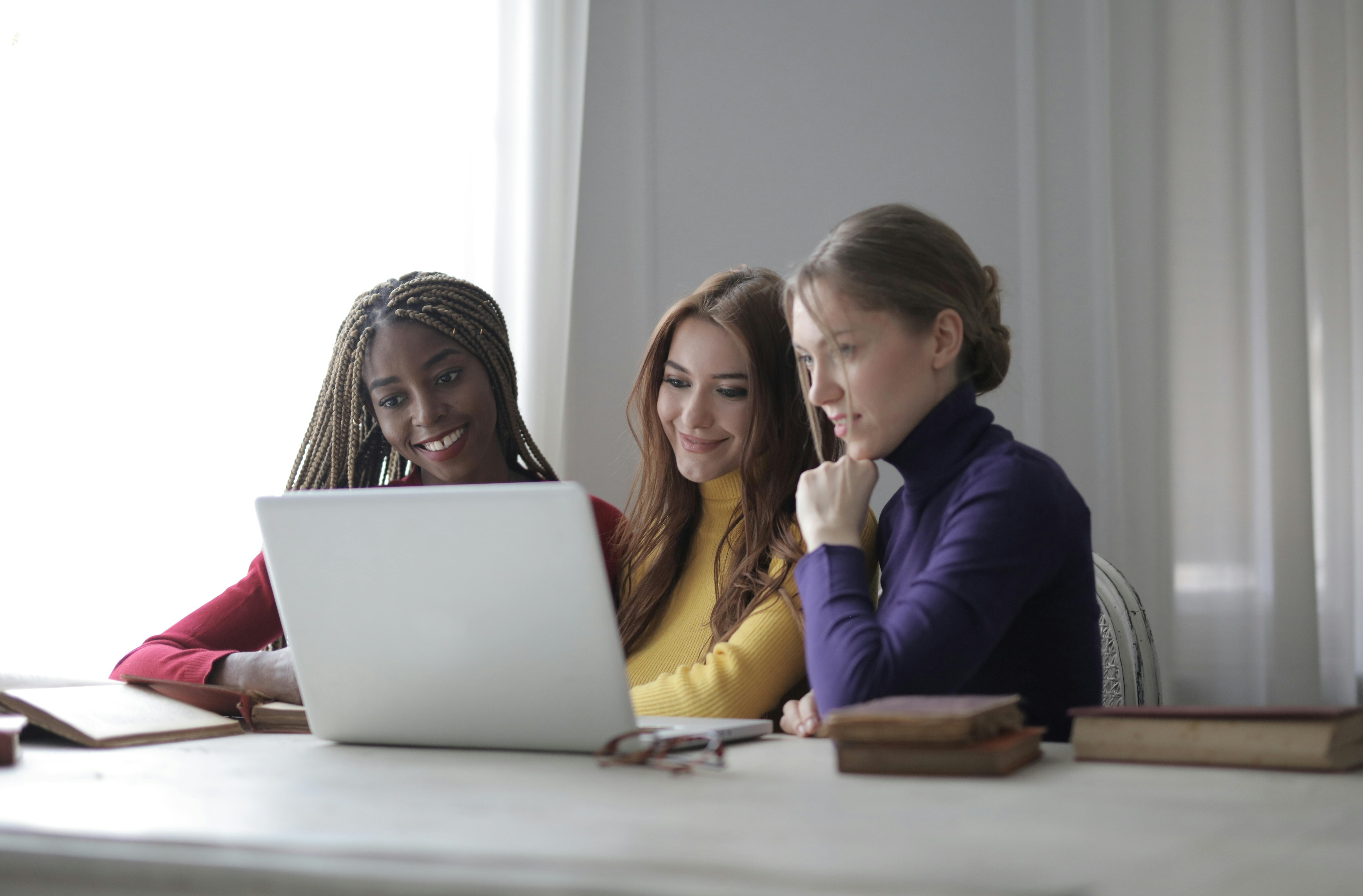 Women Looking At A Laptop · Free Stock Photo