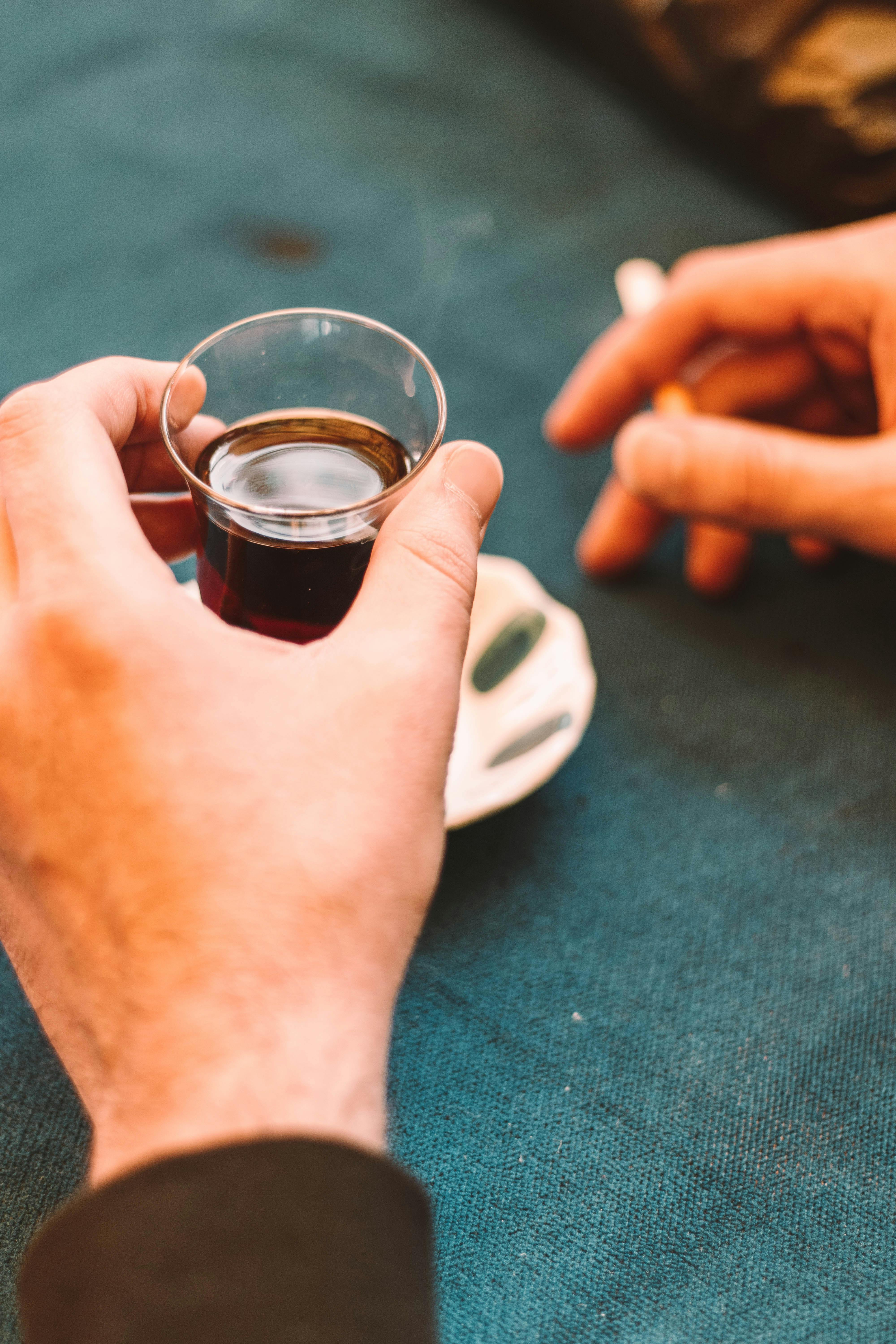 Person Holding A Shot Glass · Free Stock Photo