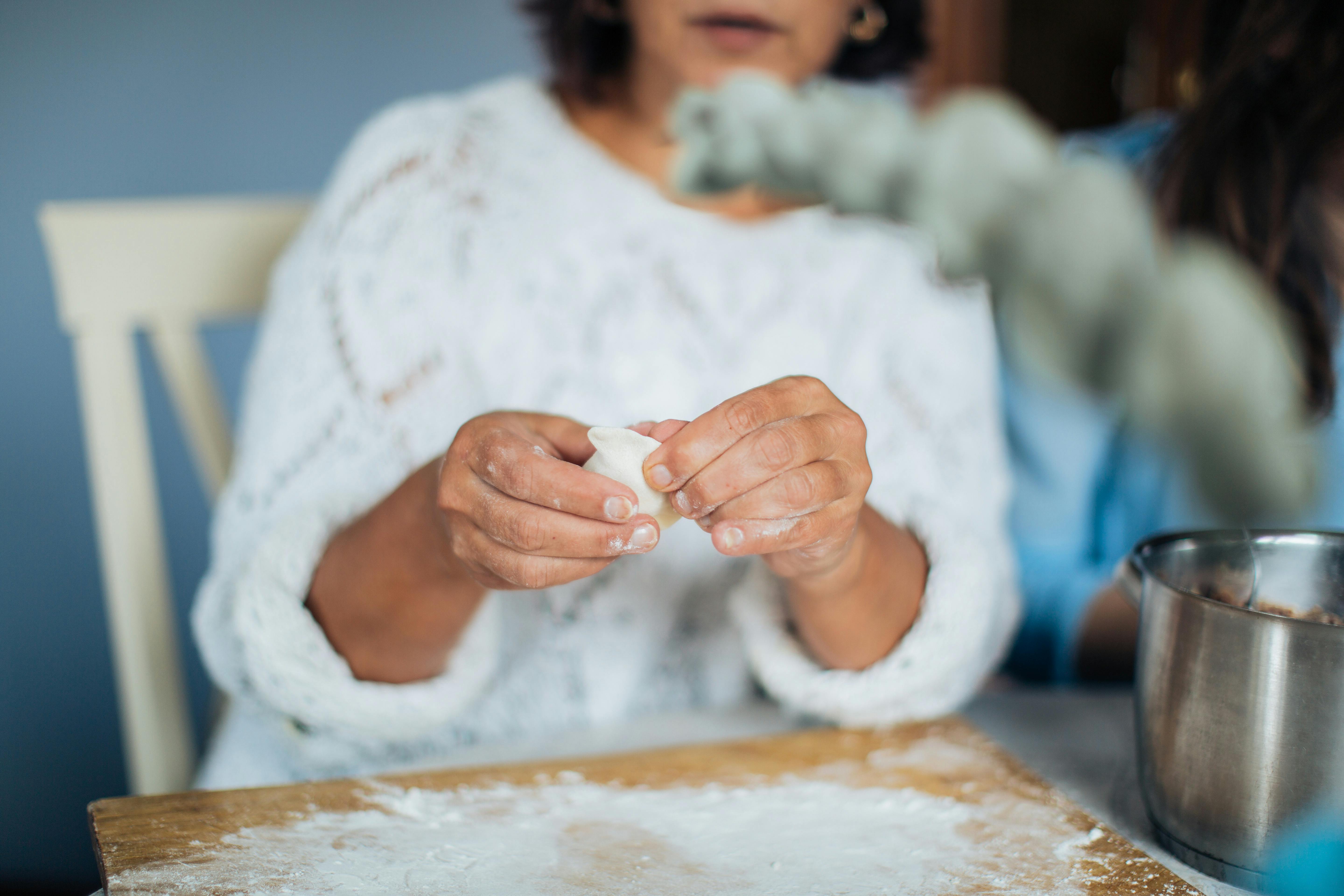Woman Making Dumplings · Free Stock Photo