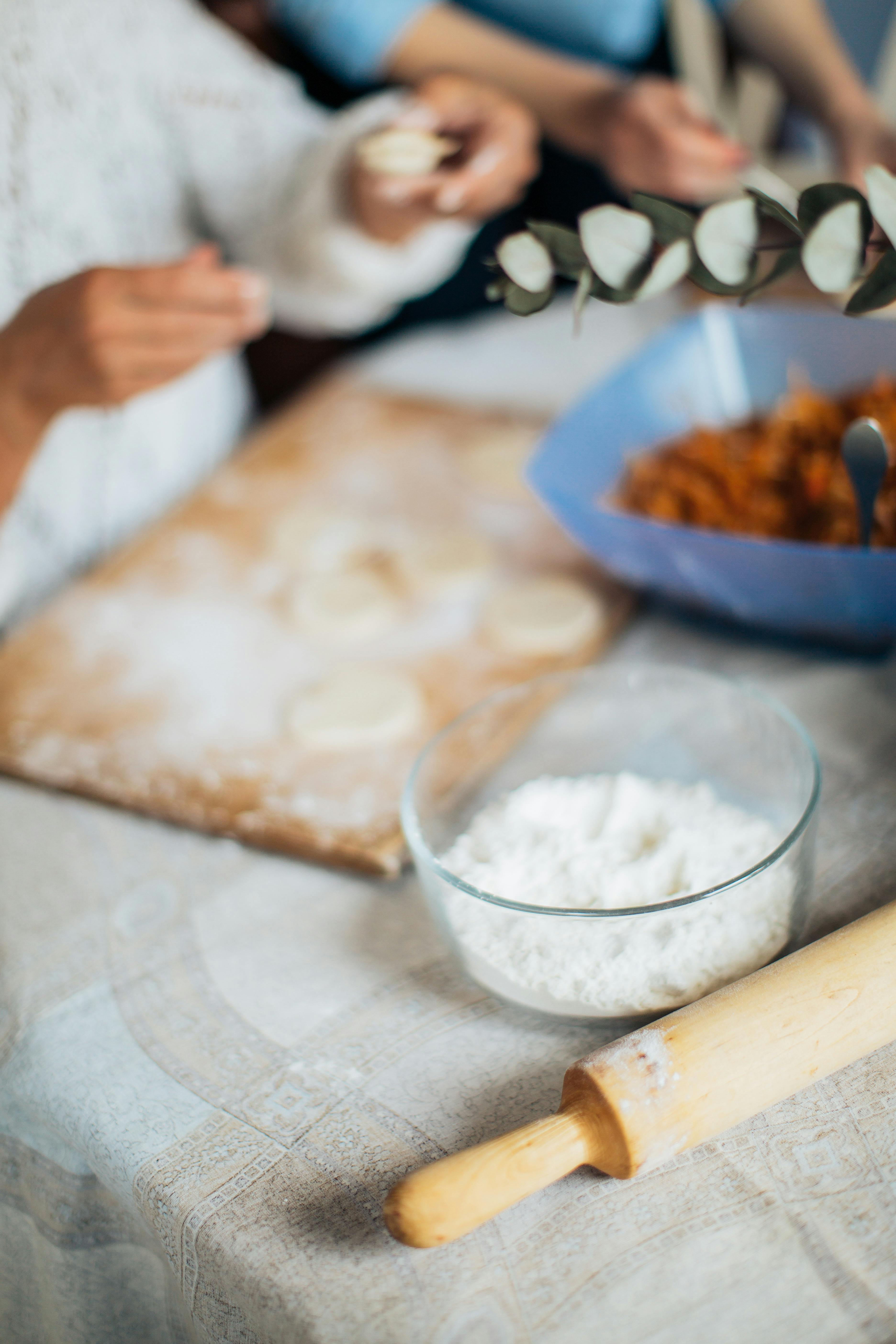 Person Rolling Out Dough · Free Stock Photo
