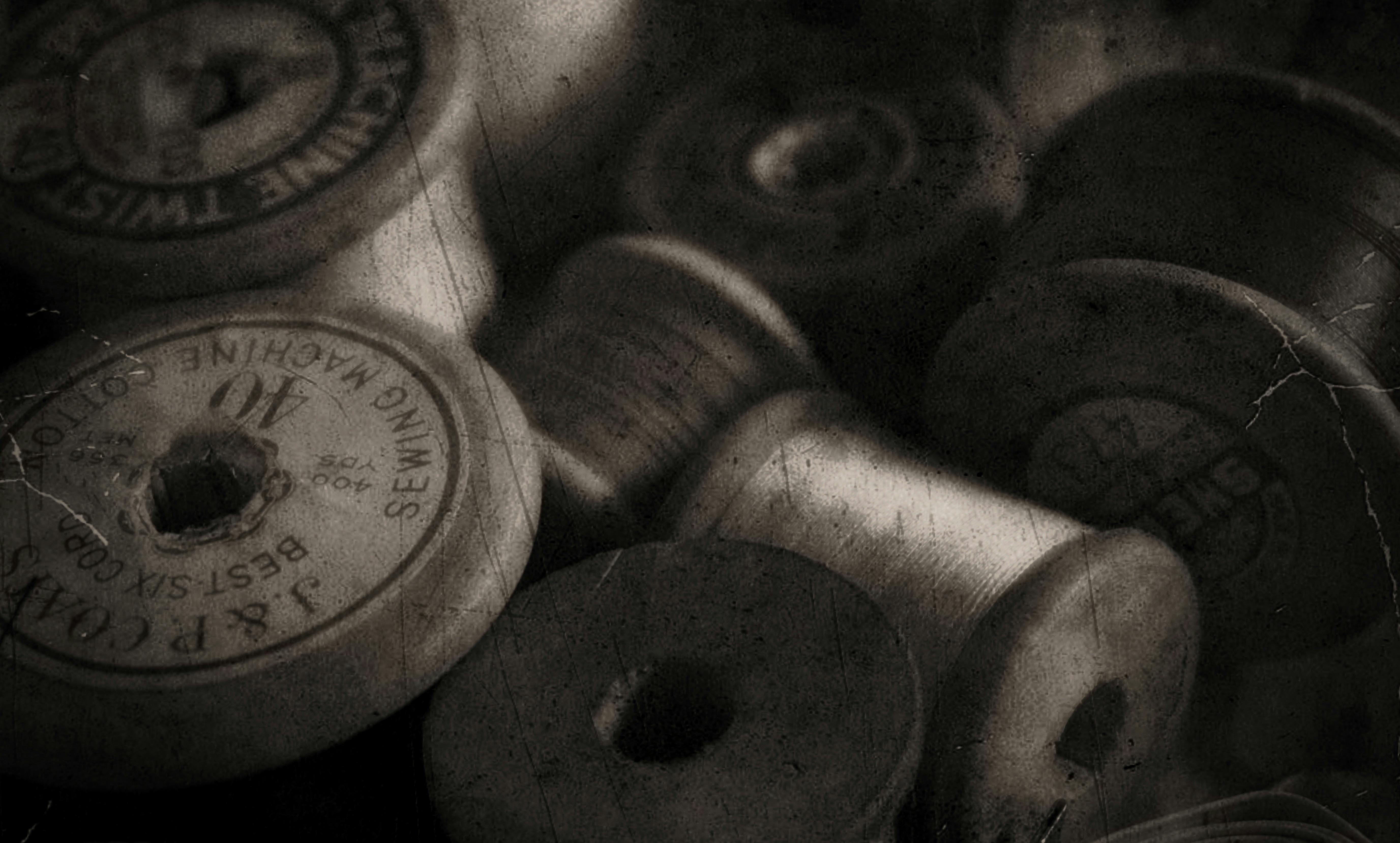 Sewing Threads on a White Surface · Free Stock Photo