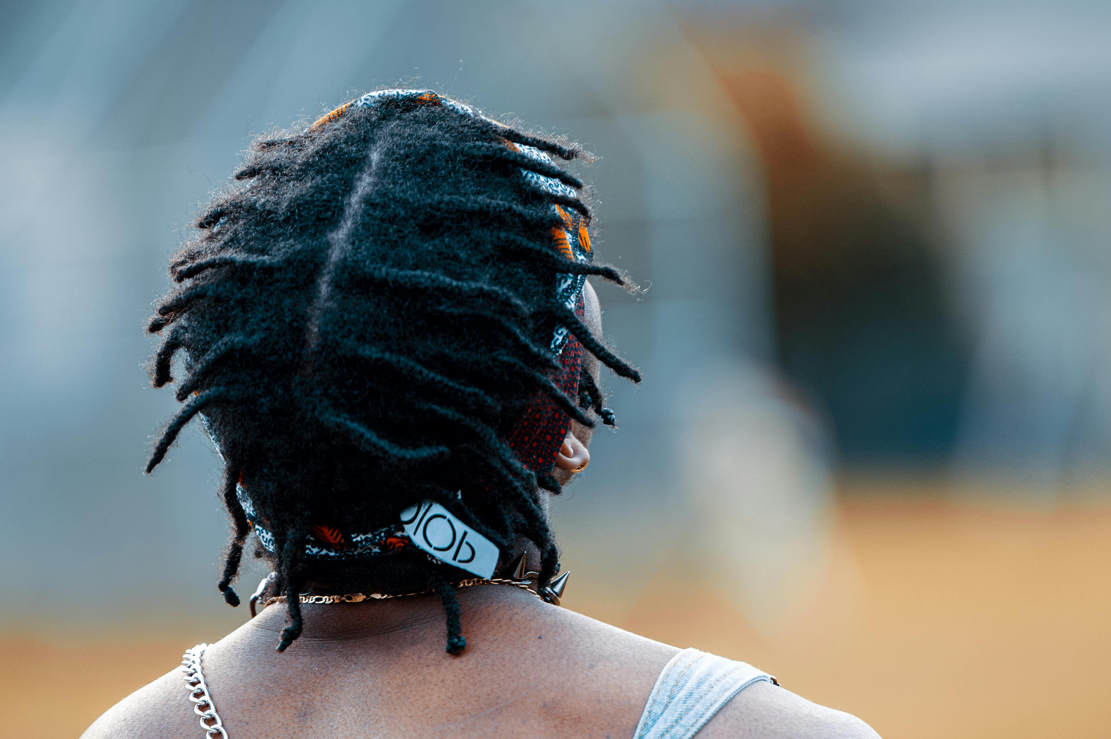 Black man with dreadlocks on street · Free Stock Photo