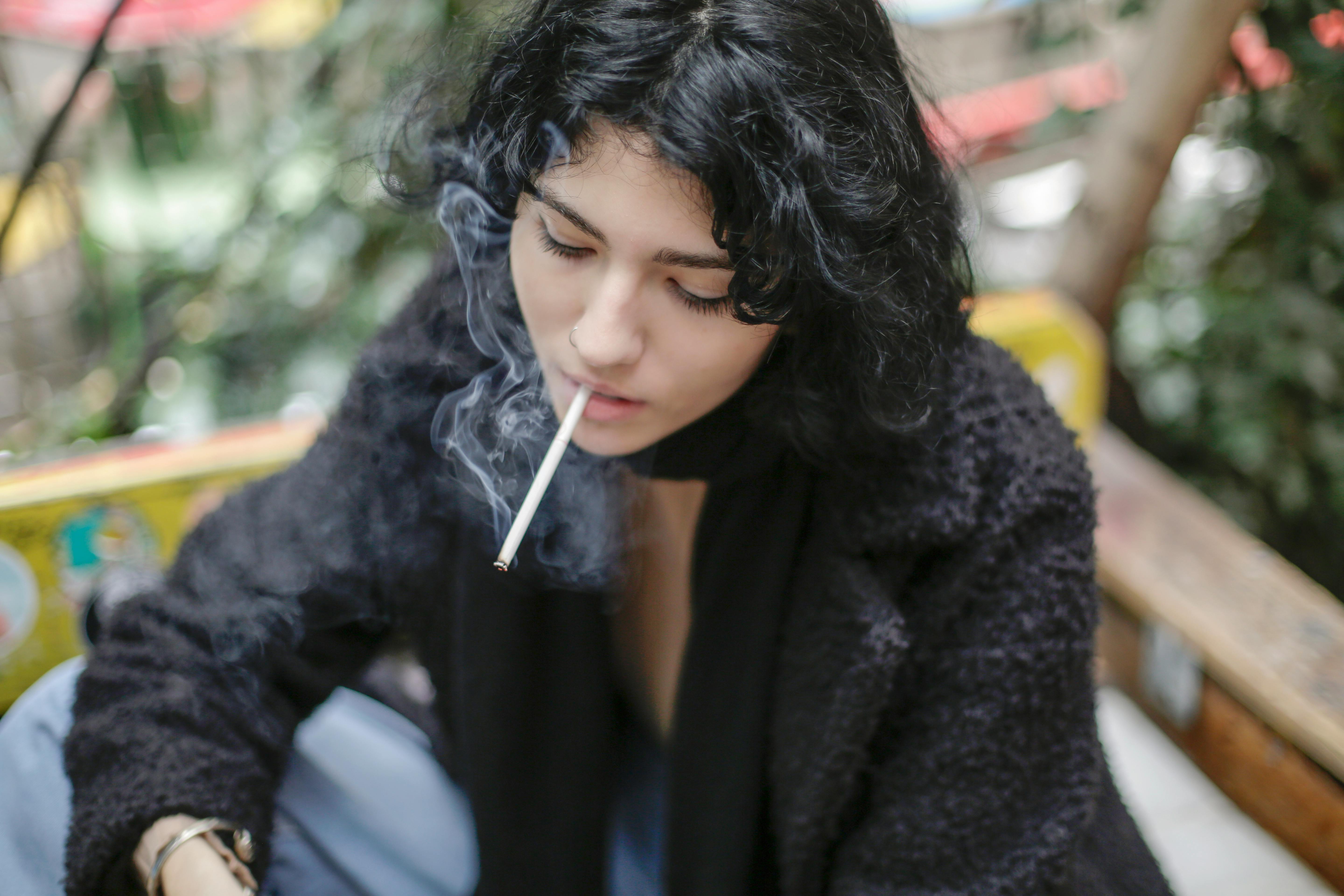 Person Smoking Cigarette · Free Stock Photo