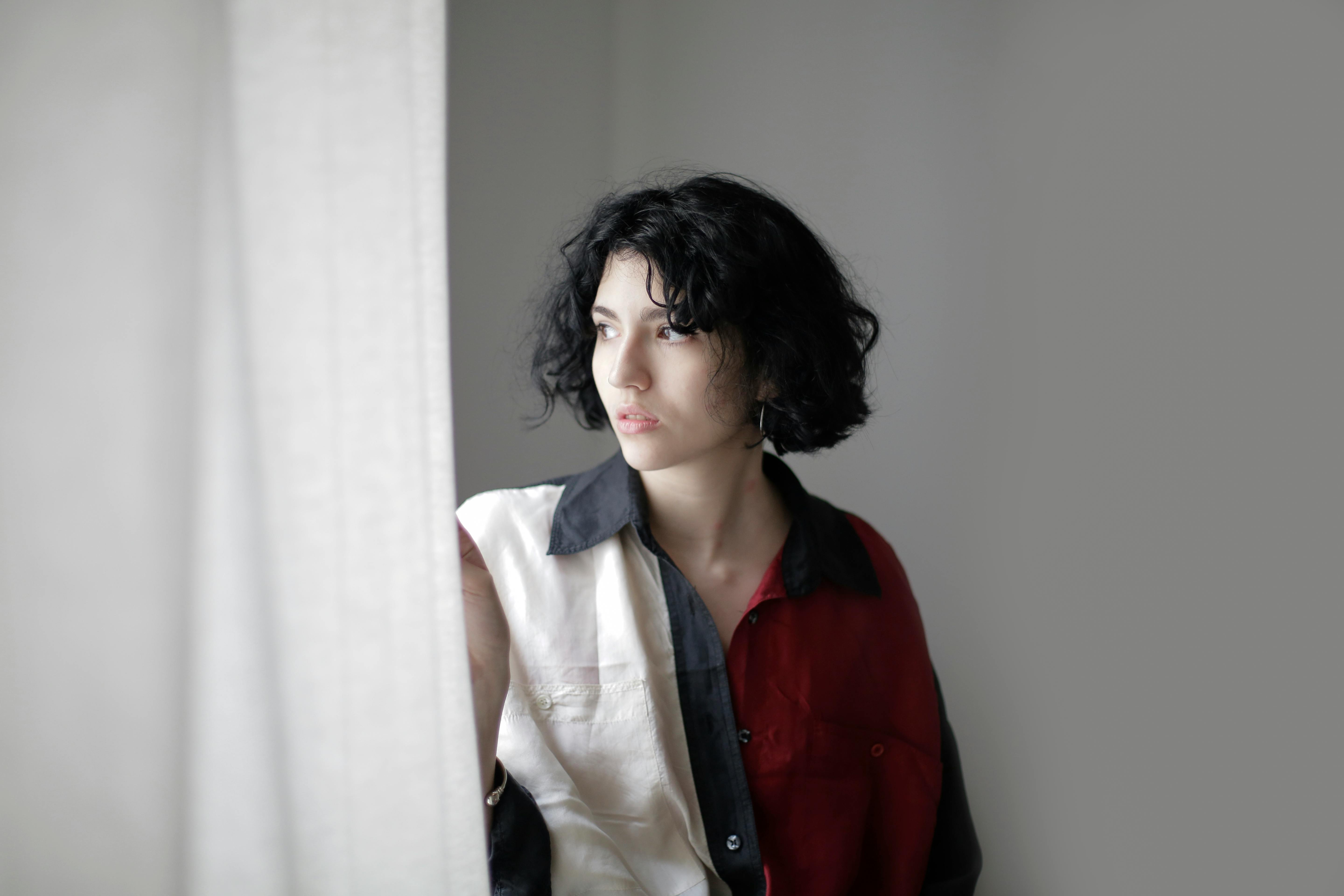 A Short Haired Girl in a Shabby Building · Free Stock Photo