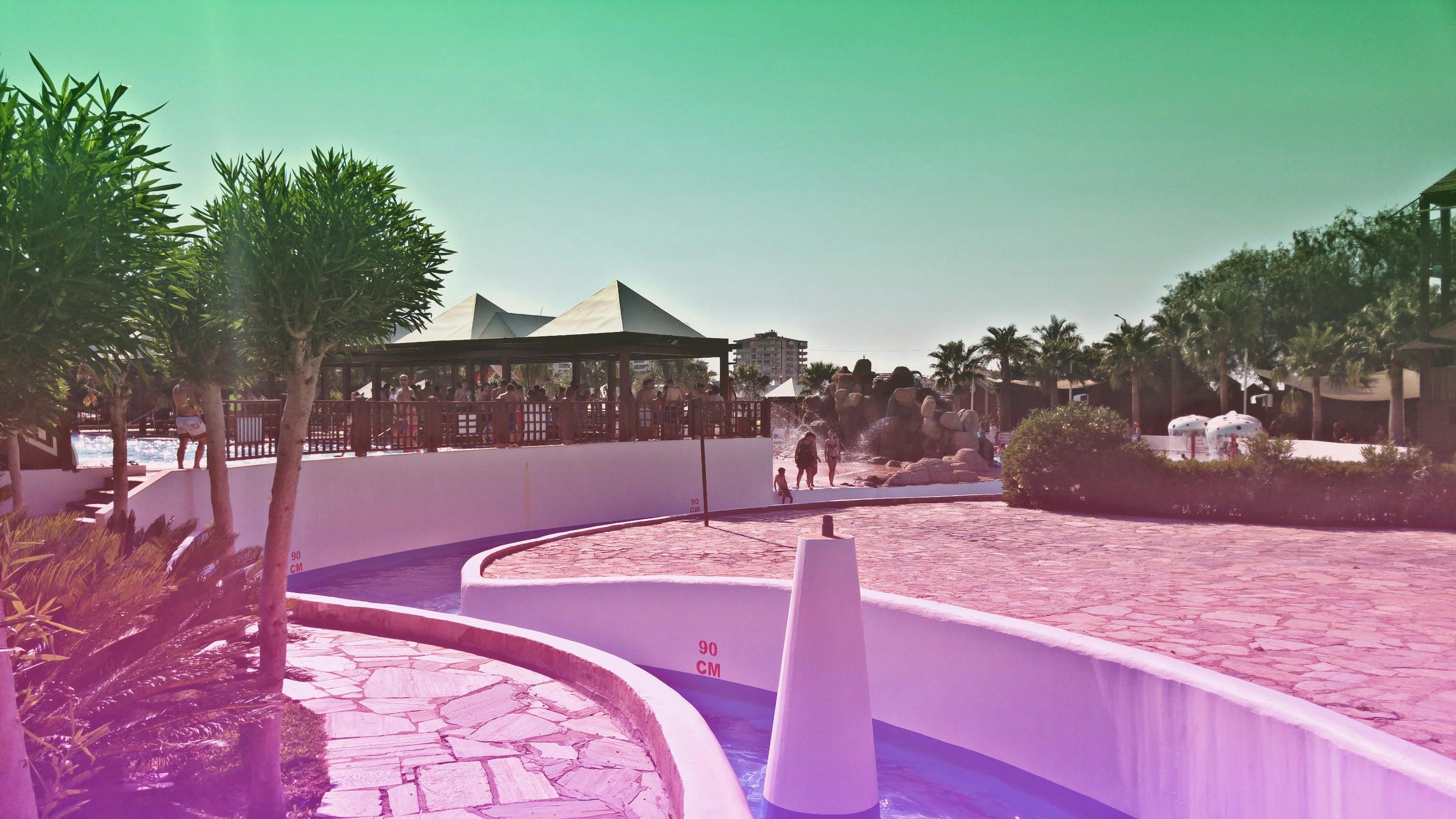 Man in Black Puffer Jacket and Distress Jeans Sitting in Couch · Free ...