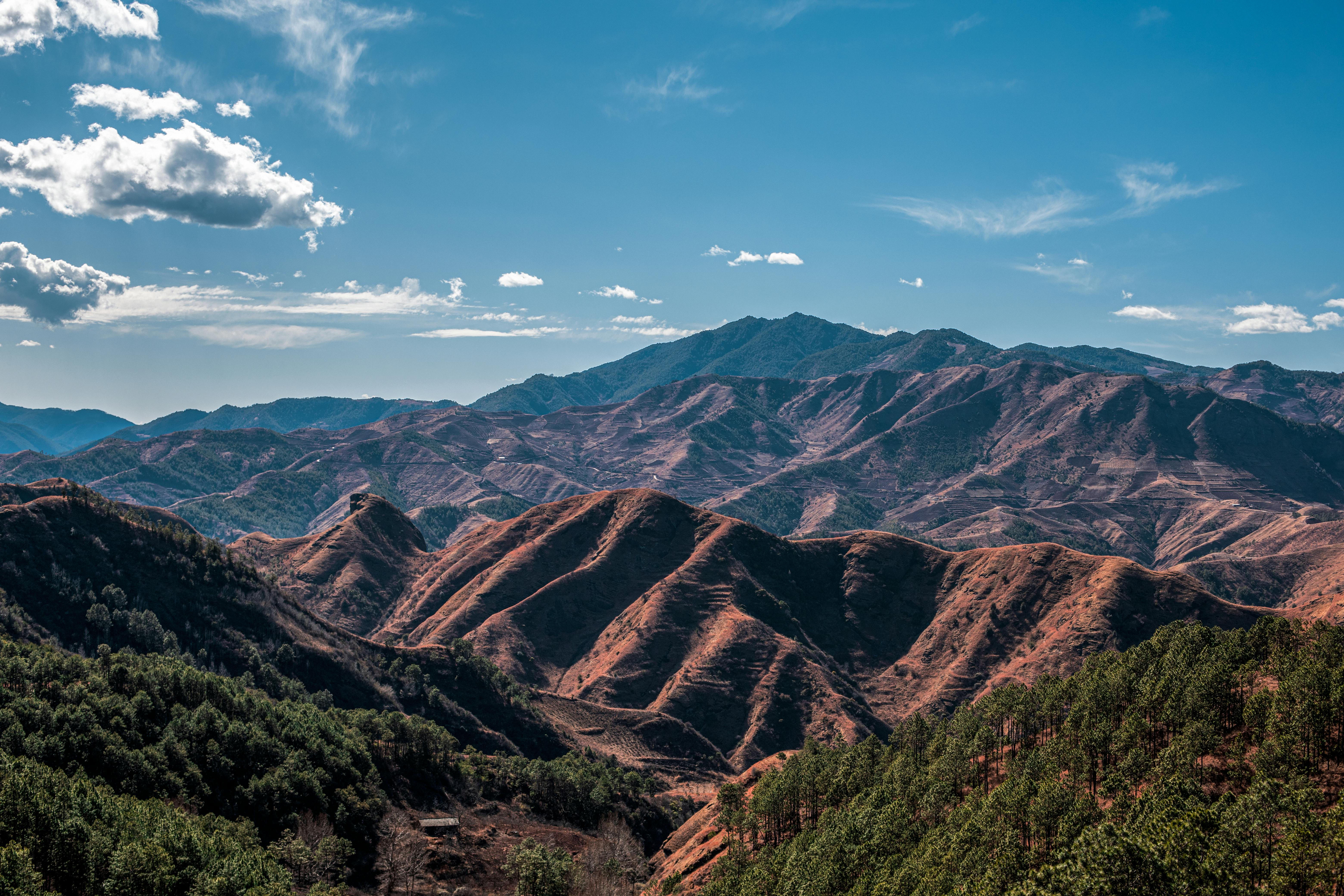 Brown Mountains Under Blue Sky · Free Stock Photo