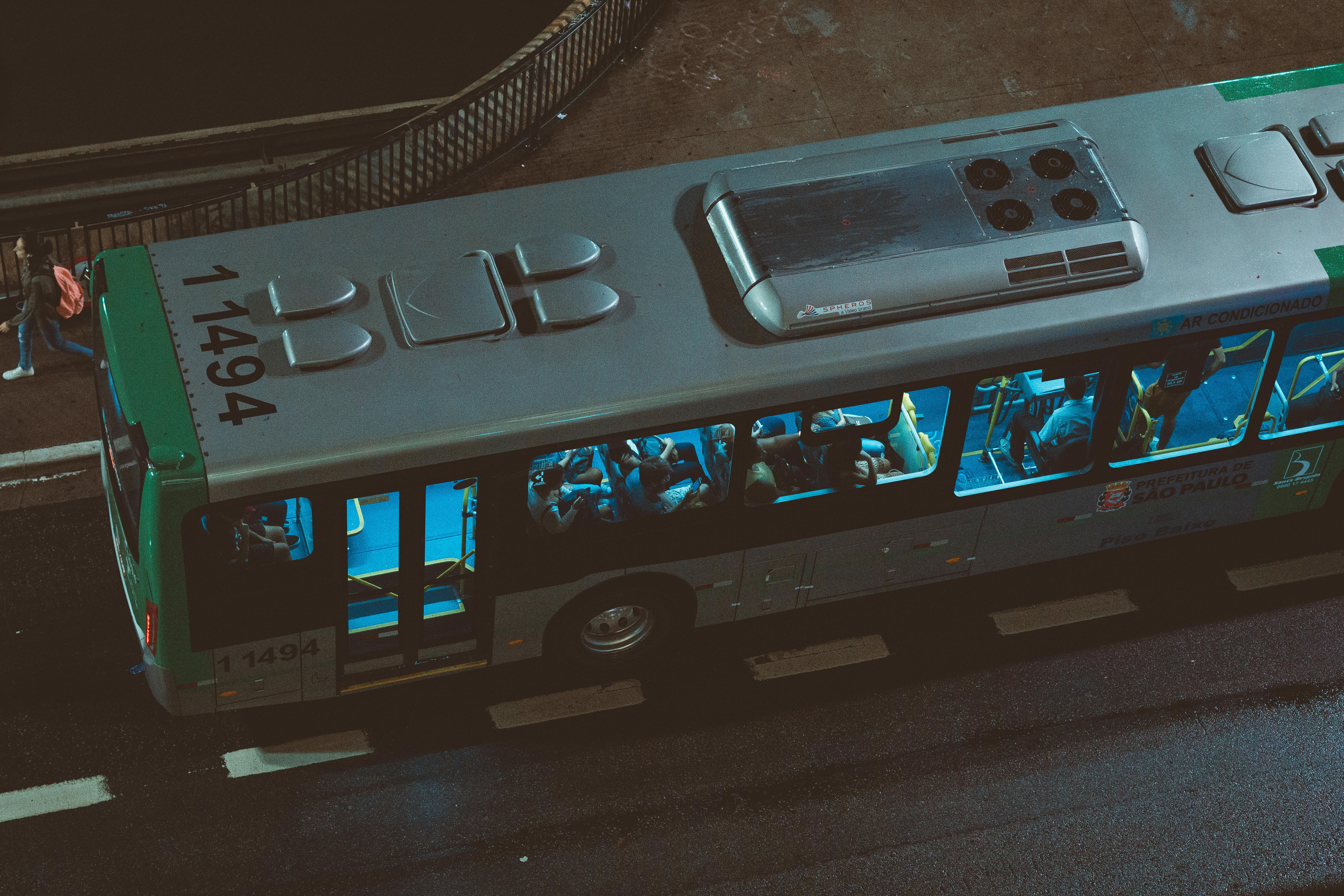 Aerial Shot Of A Bus On The Road · Free Stock Photo