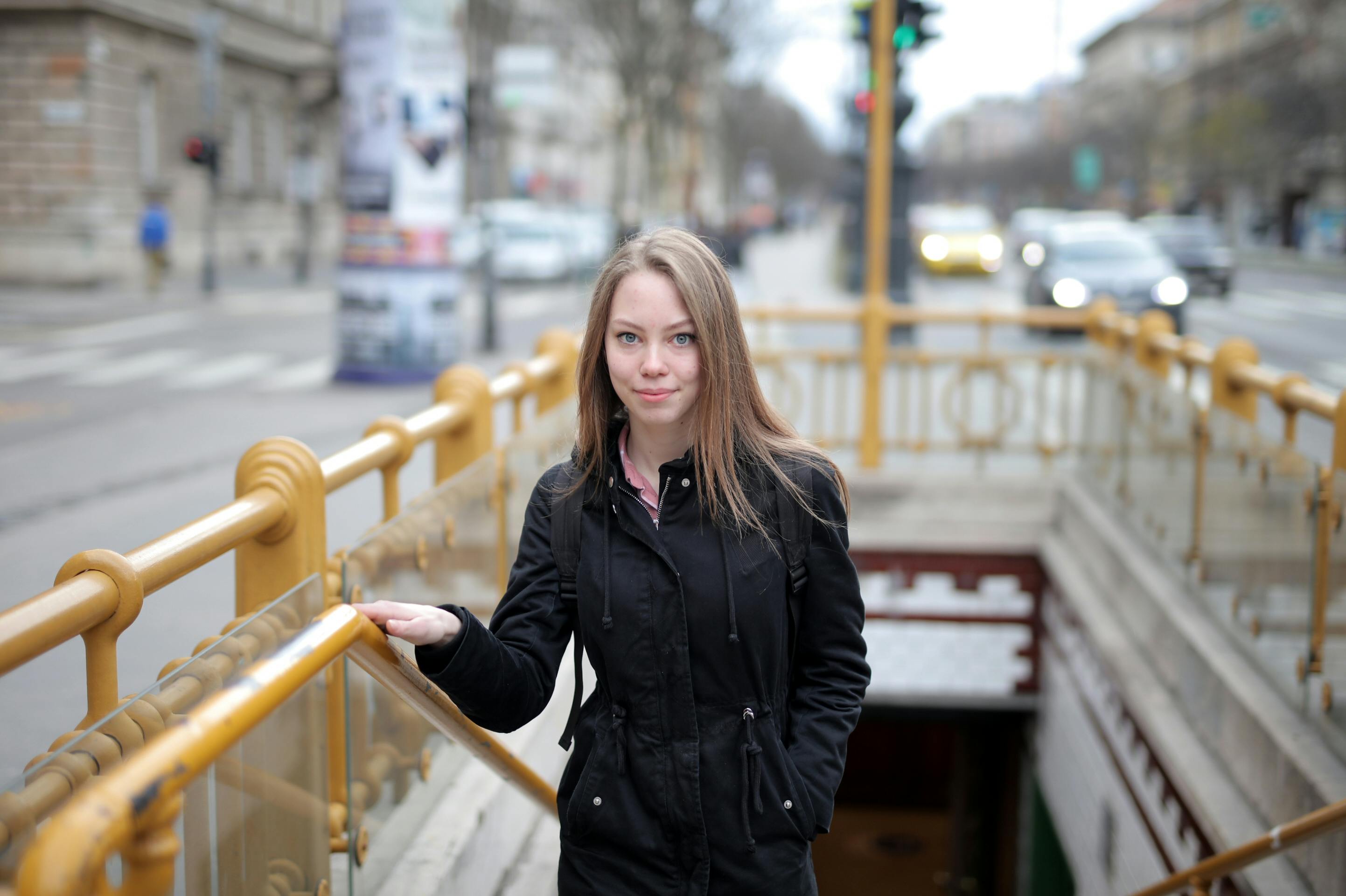 Woman Leaning on Hand Rails · Free Stock Photo