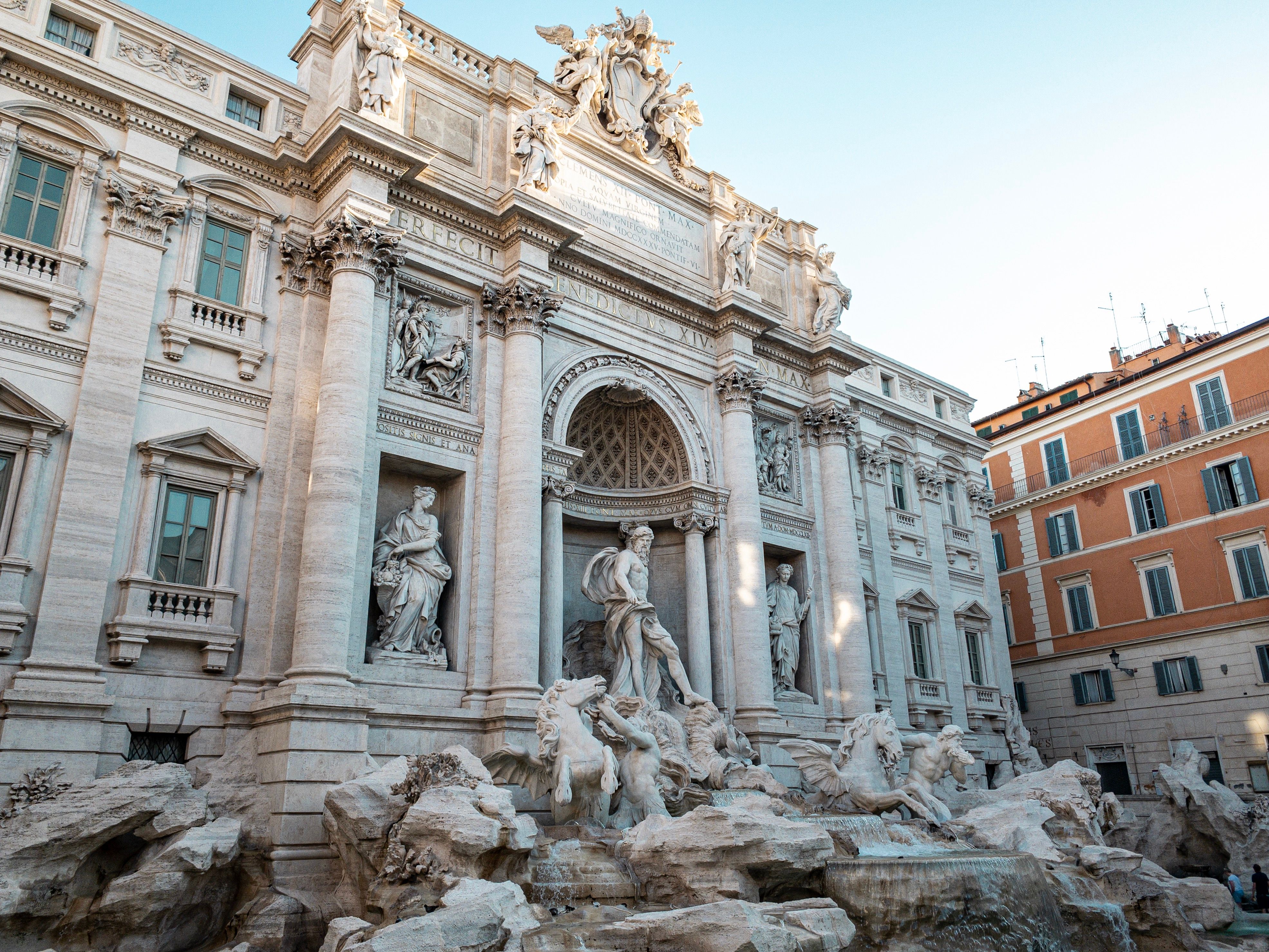 Concrete Structure With Group of People Statues · Free Stock Photo