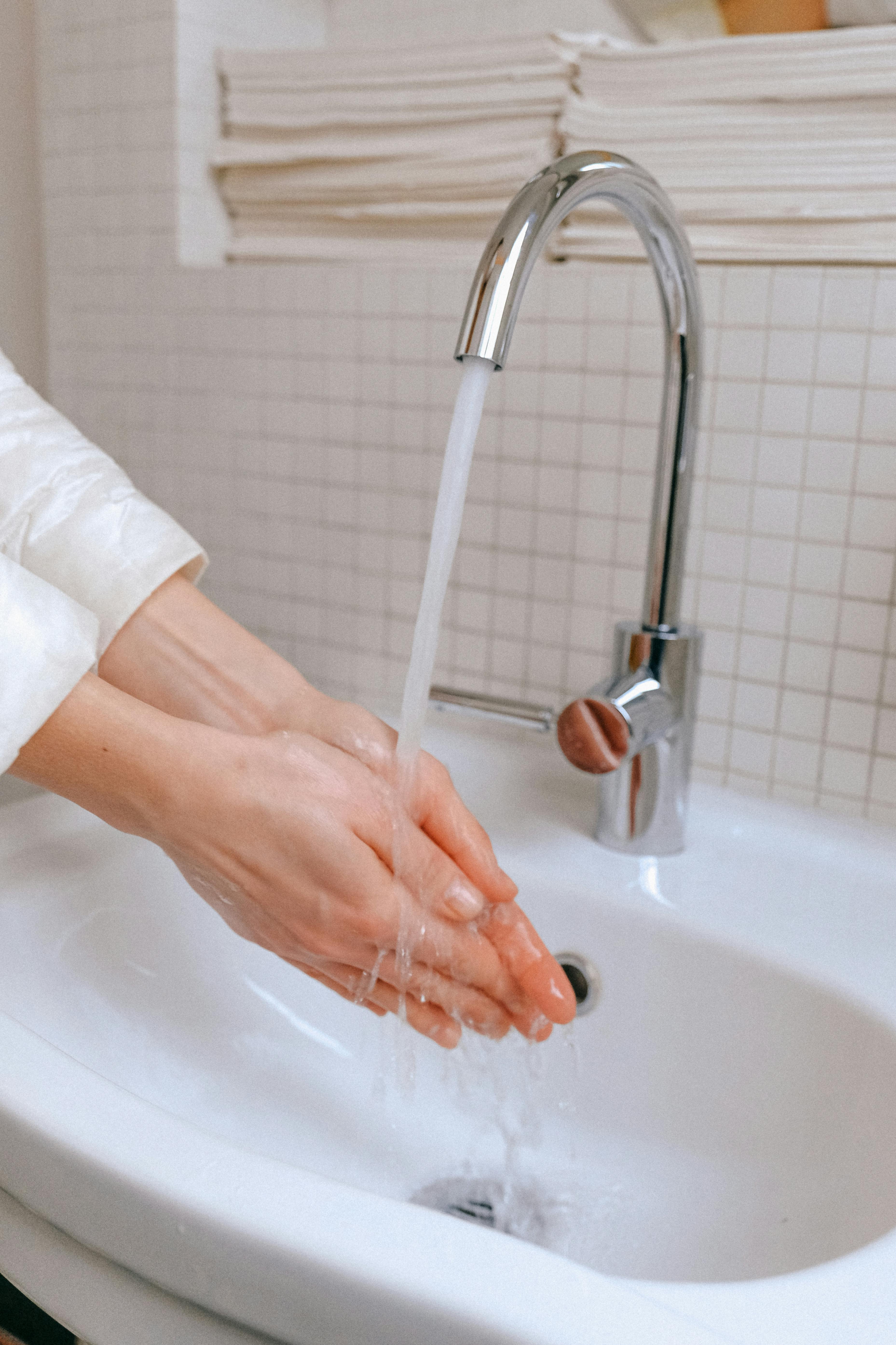Person Washing Hands · Free Stock Photo