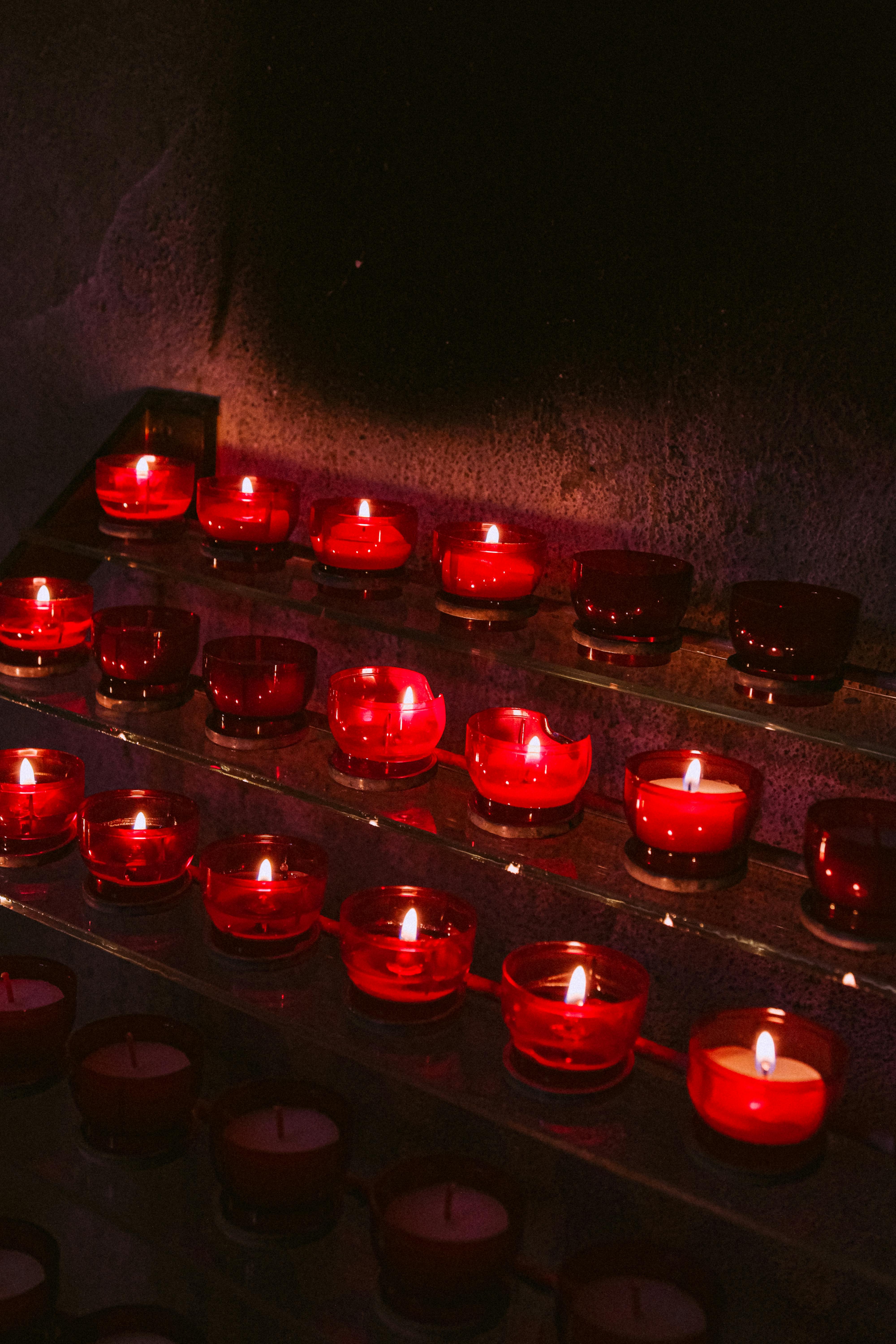 Lighted Red Candles · Free Stock Photo