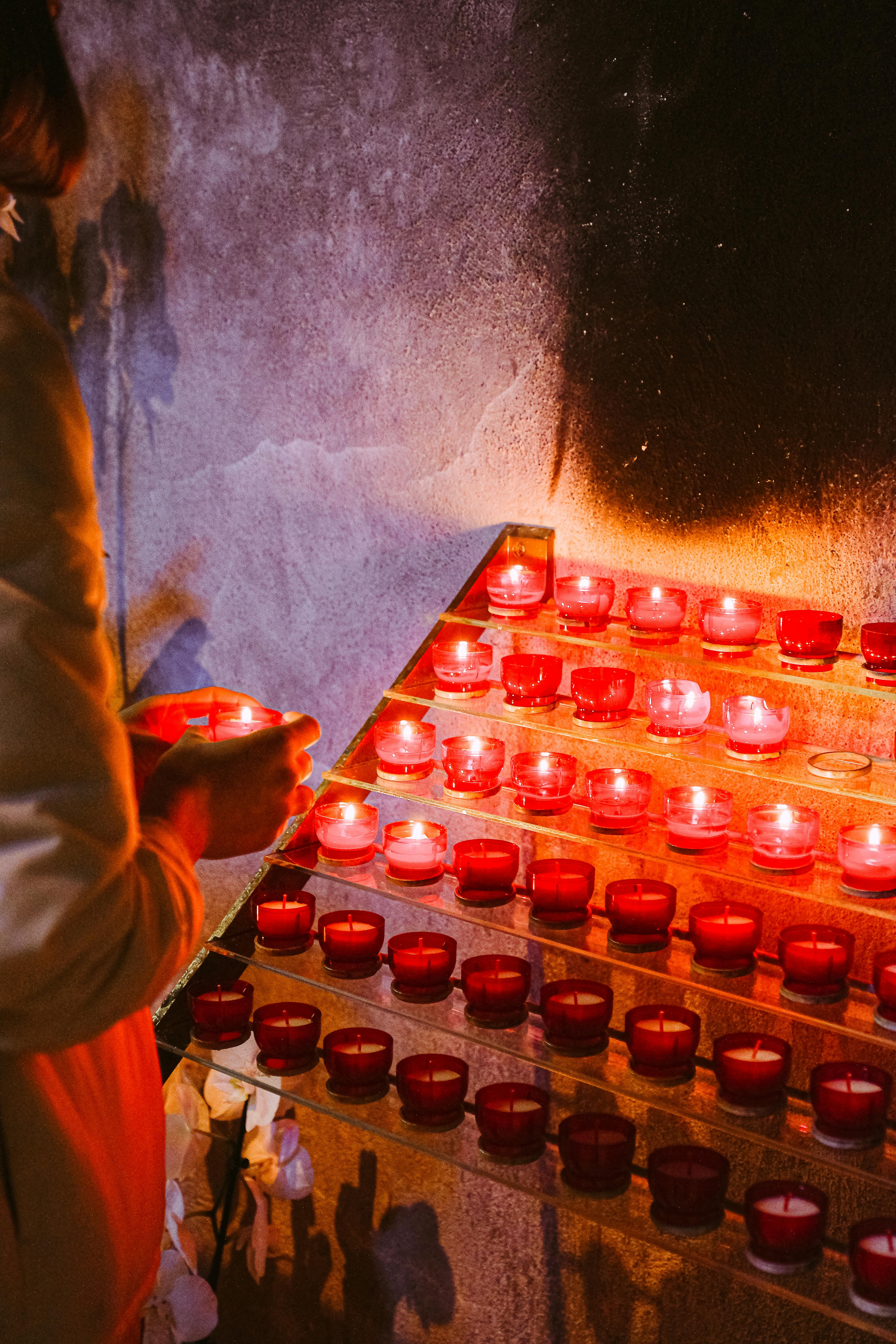 Person Holding Red Candle · Free Stock Photo