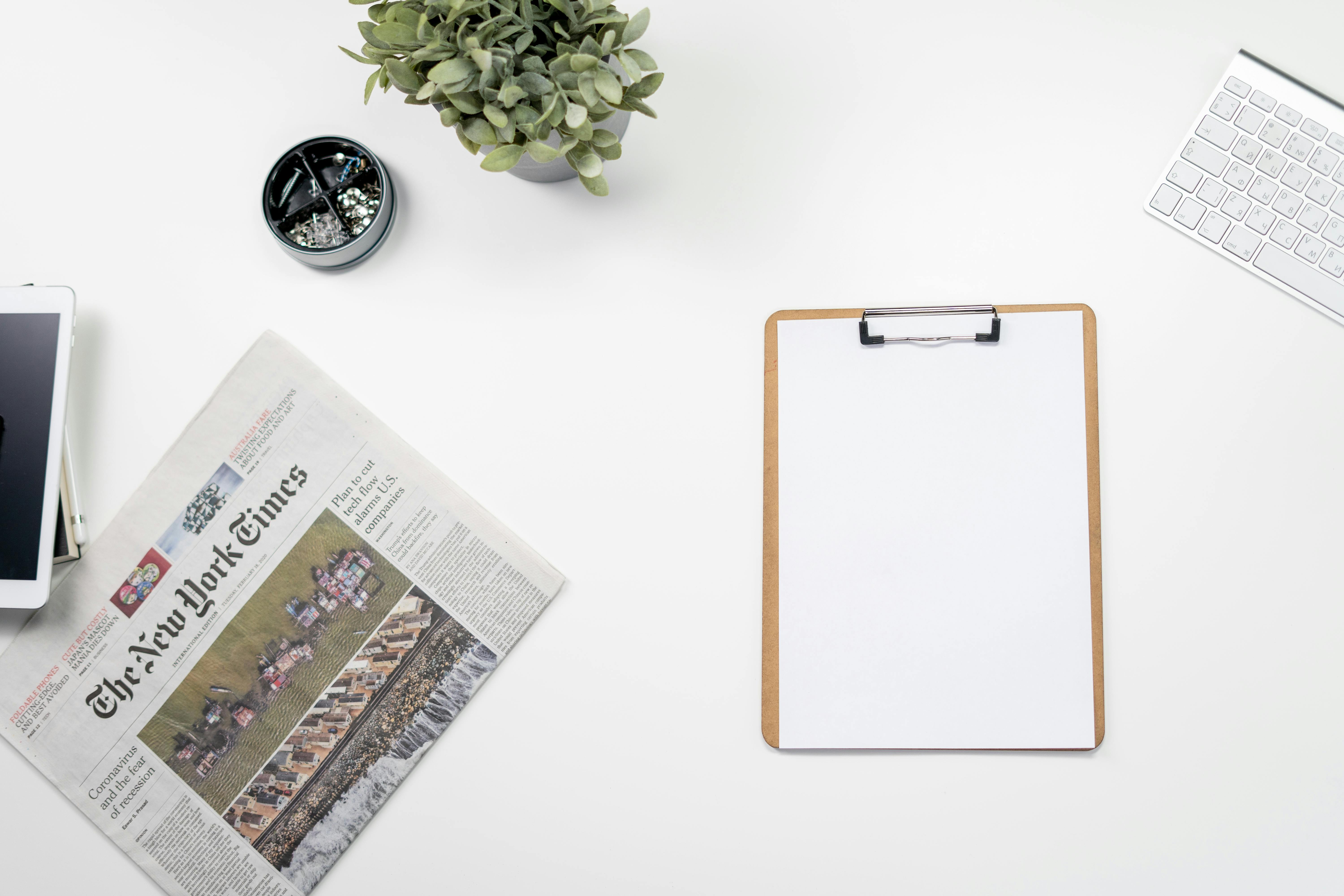 Newspaper on Desk · Free Stock Photo