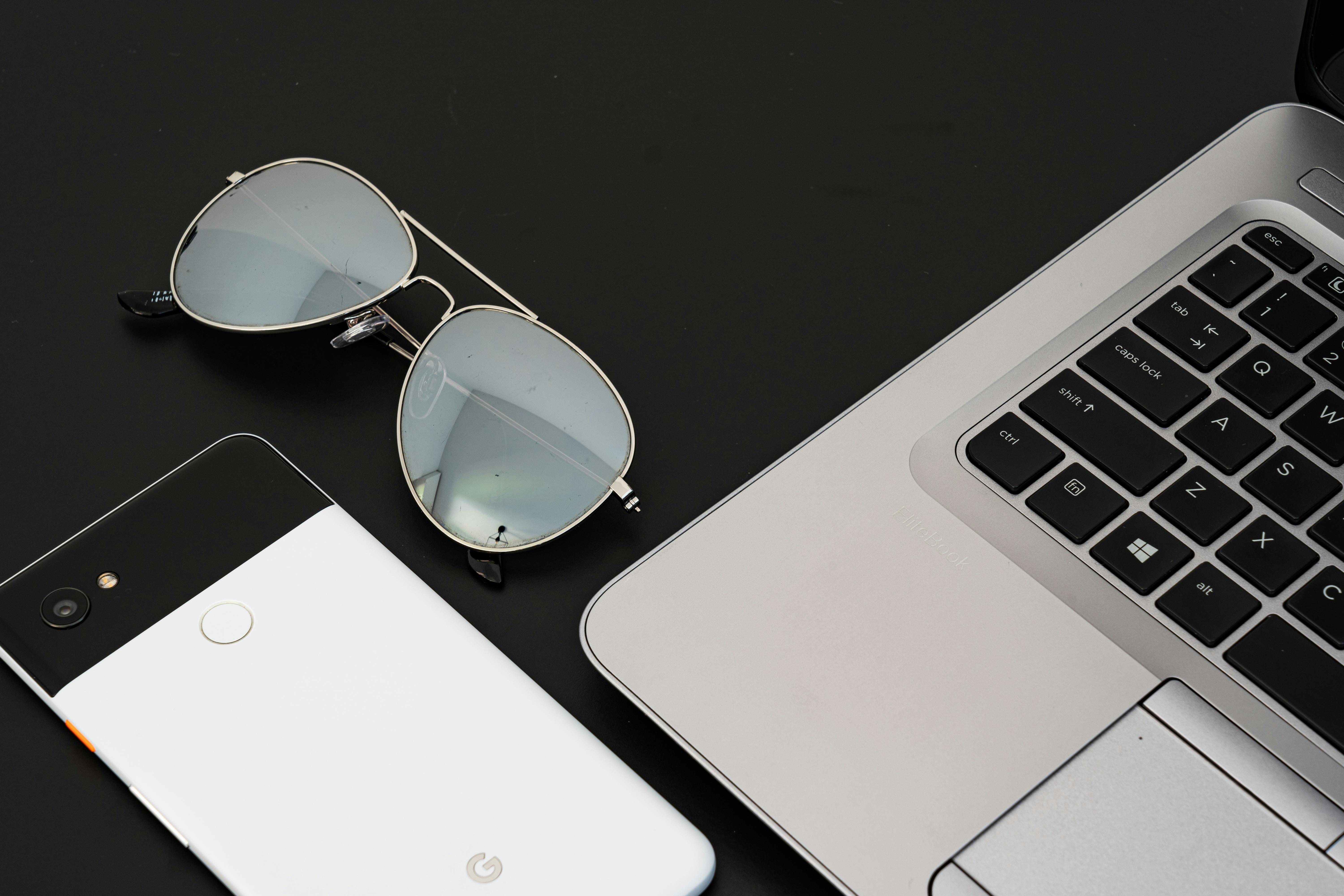 Smartphone Beside a Laptop · Free Stock Photo