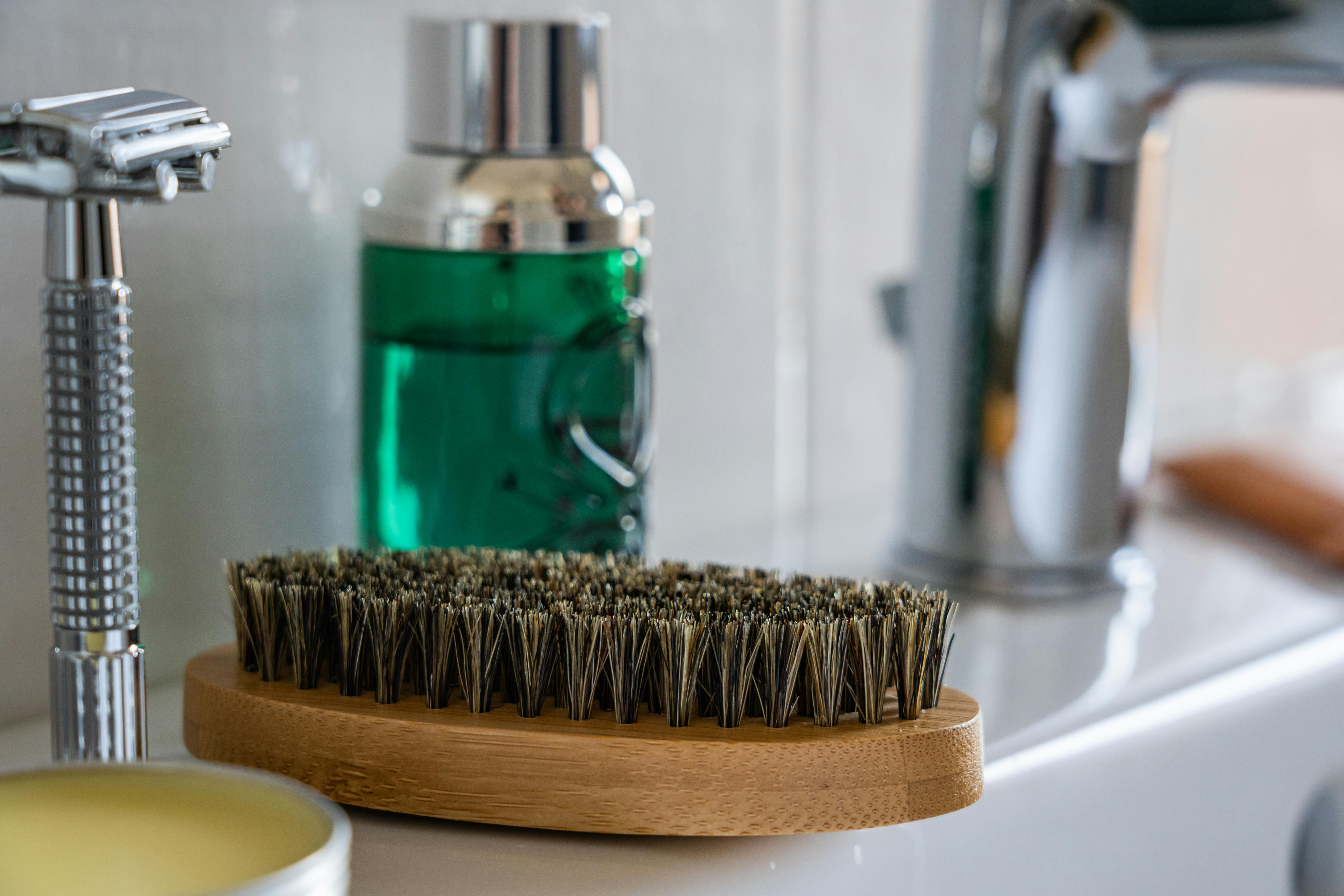 Wax In A Container Beside Brushes And Shaver · Free Stock Photo