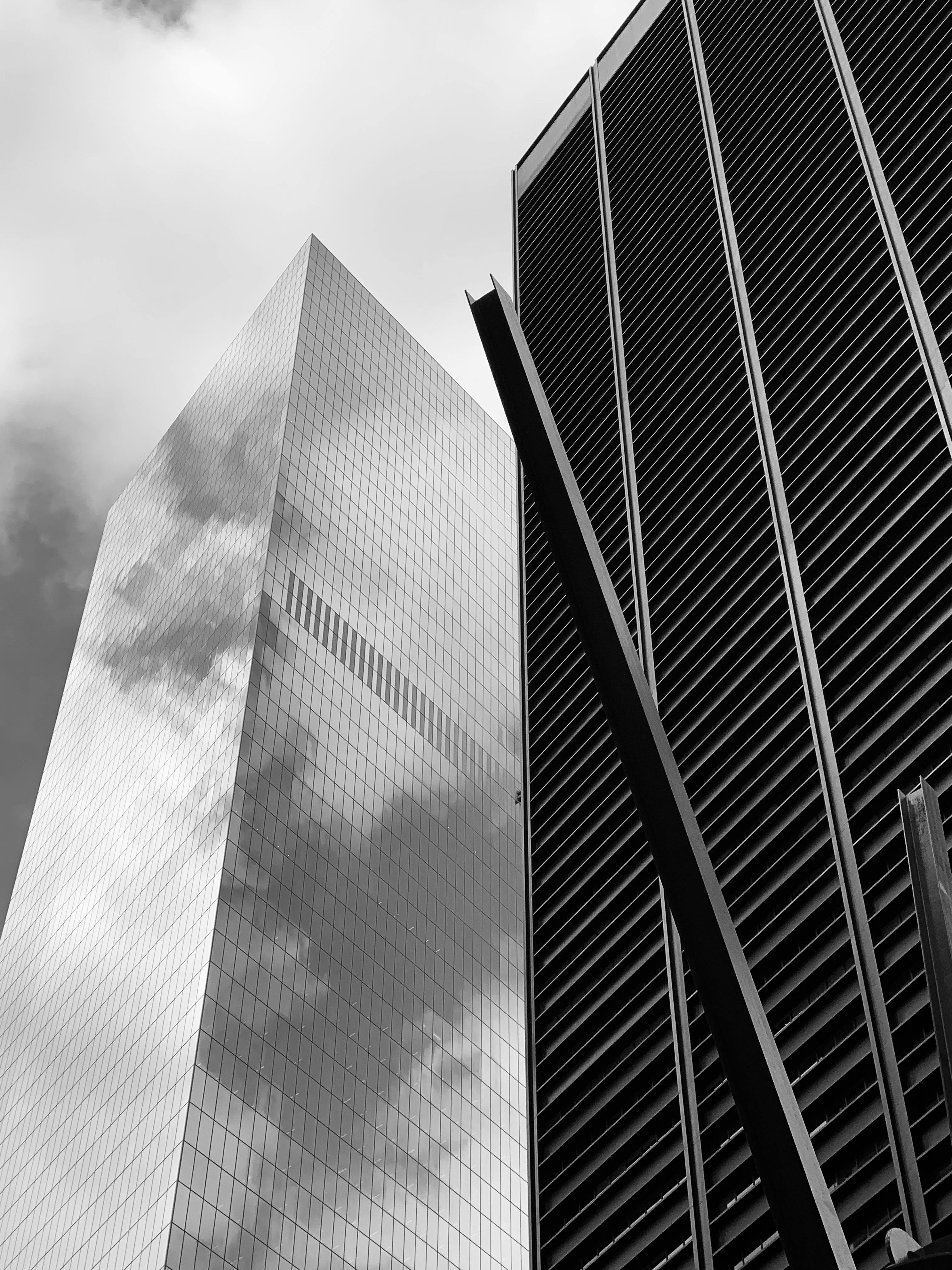 Grayscale Photo Of High Rise Buildings · Free Stock Photo