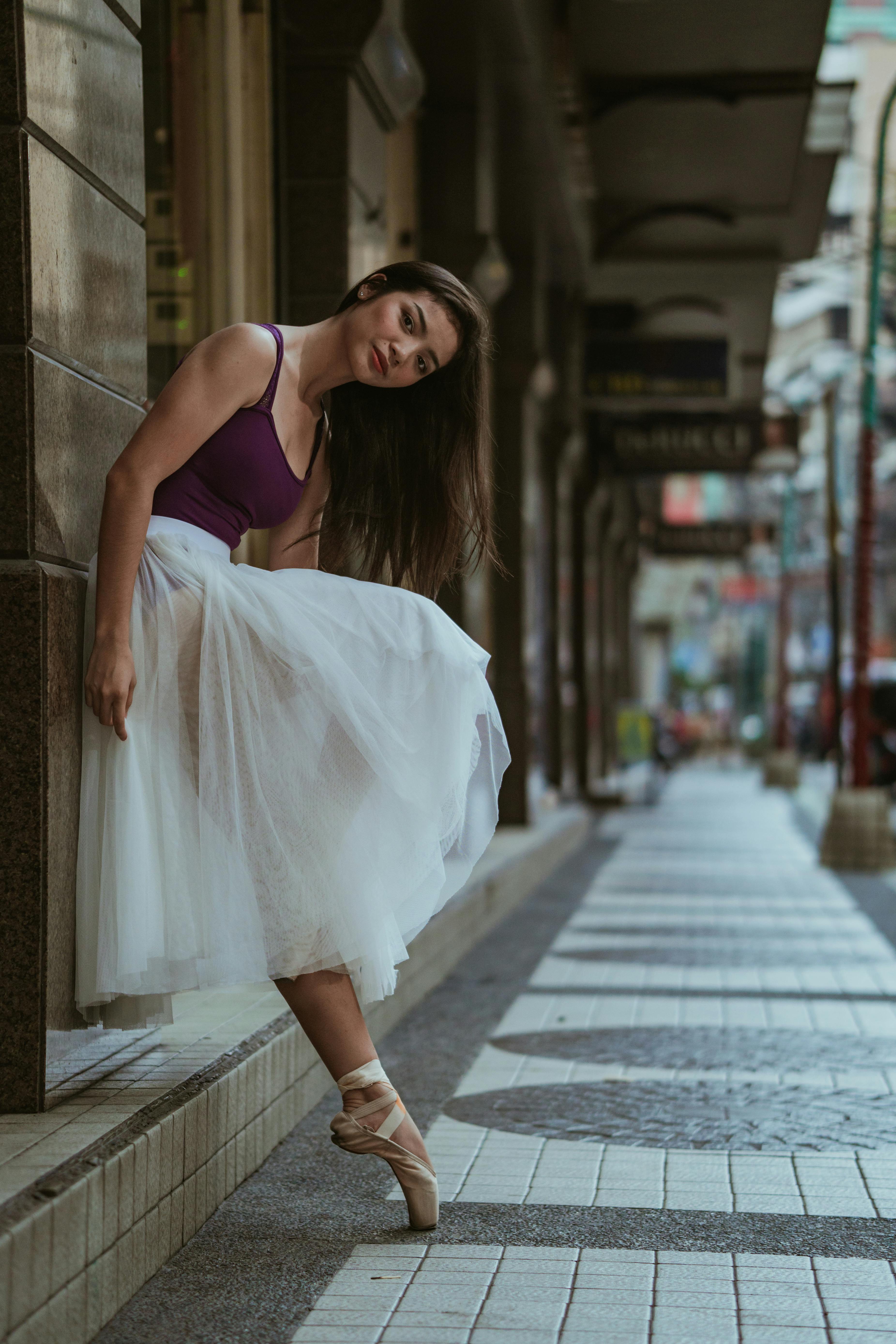 Woman Doing Ballet Dance on Side Walk in Grayscale Photo · Free Stock Photo