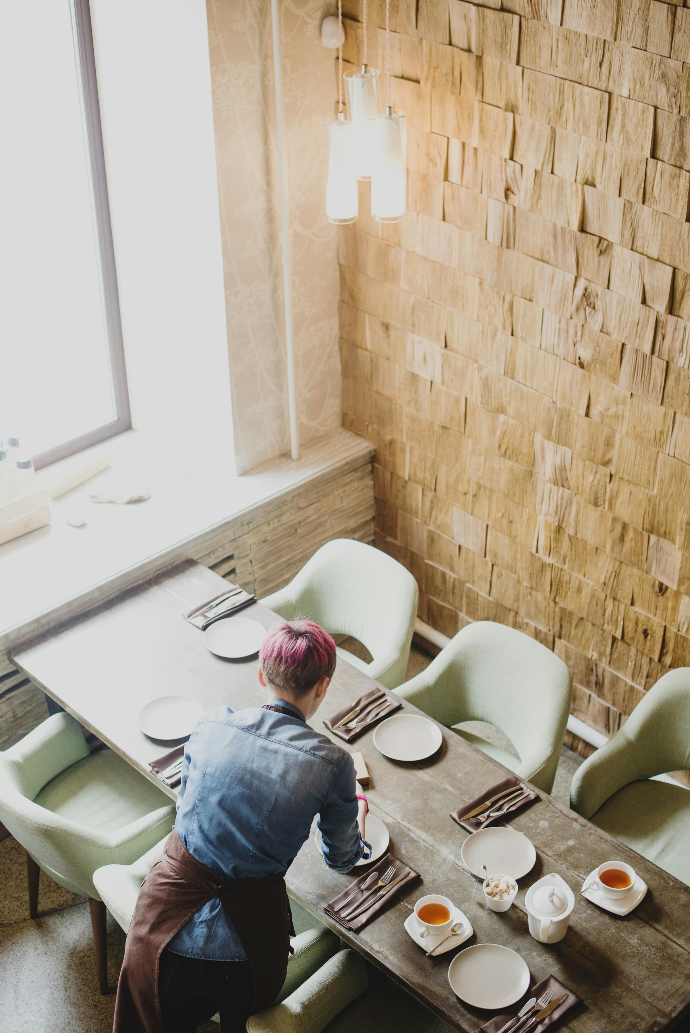 Person Setting Up The Table · Free Stock Photo