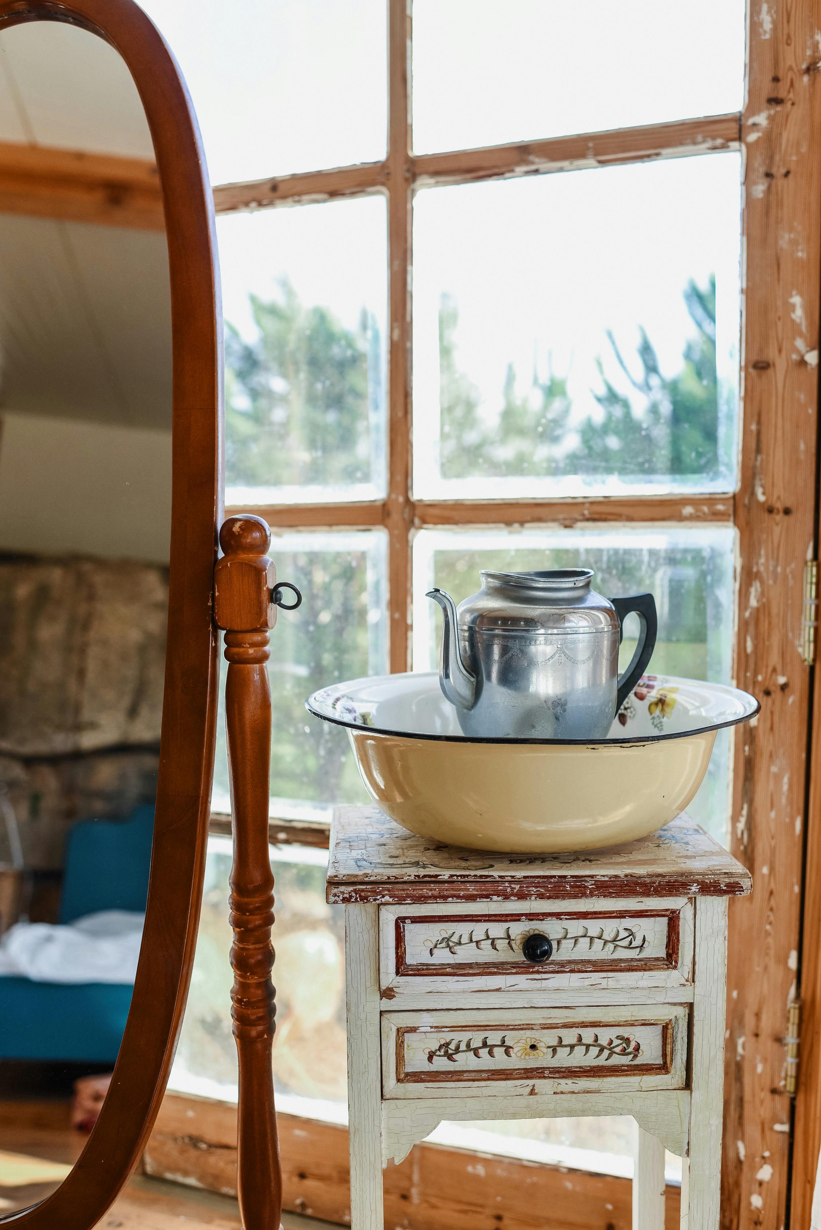 Stainless Steel Bowl on Brown Wooden Table · Free Stock Photo