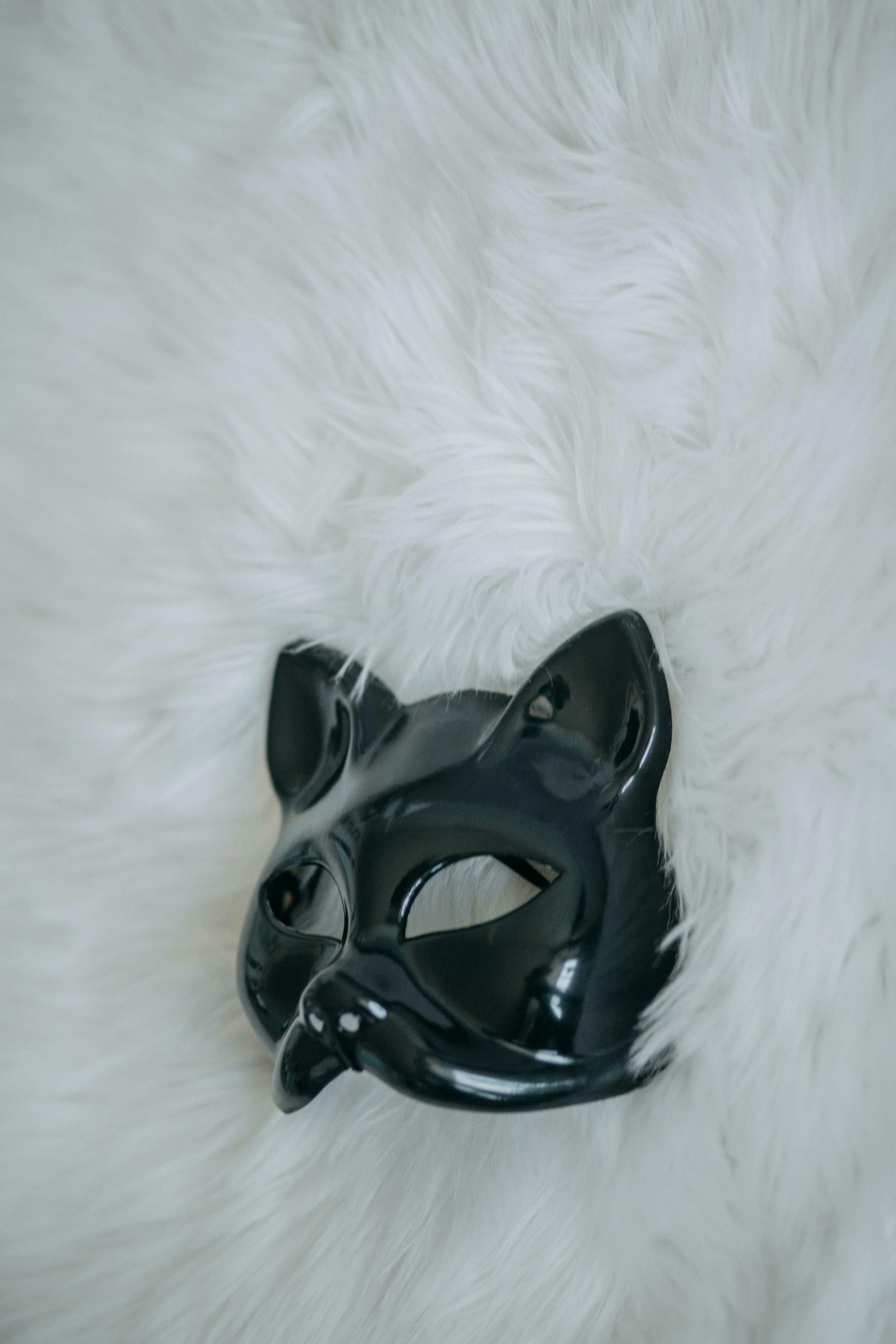 Black Animal Mask on White Fur · Free Stock Photo