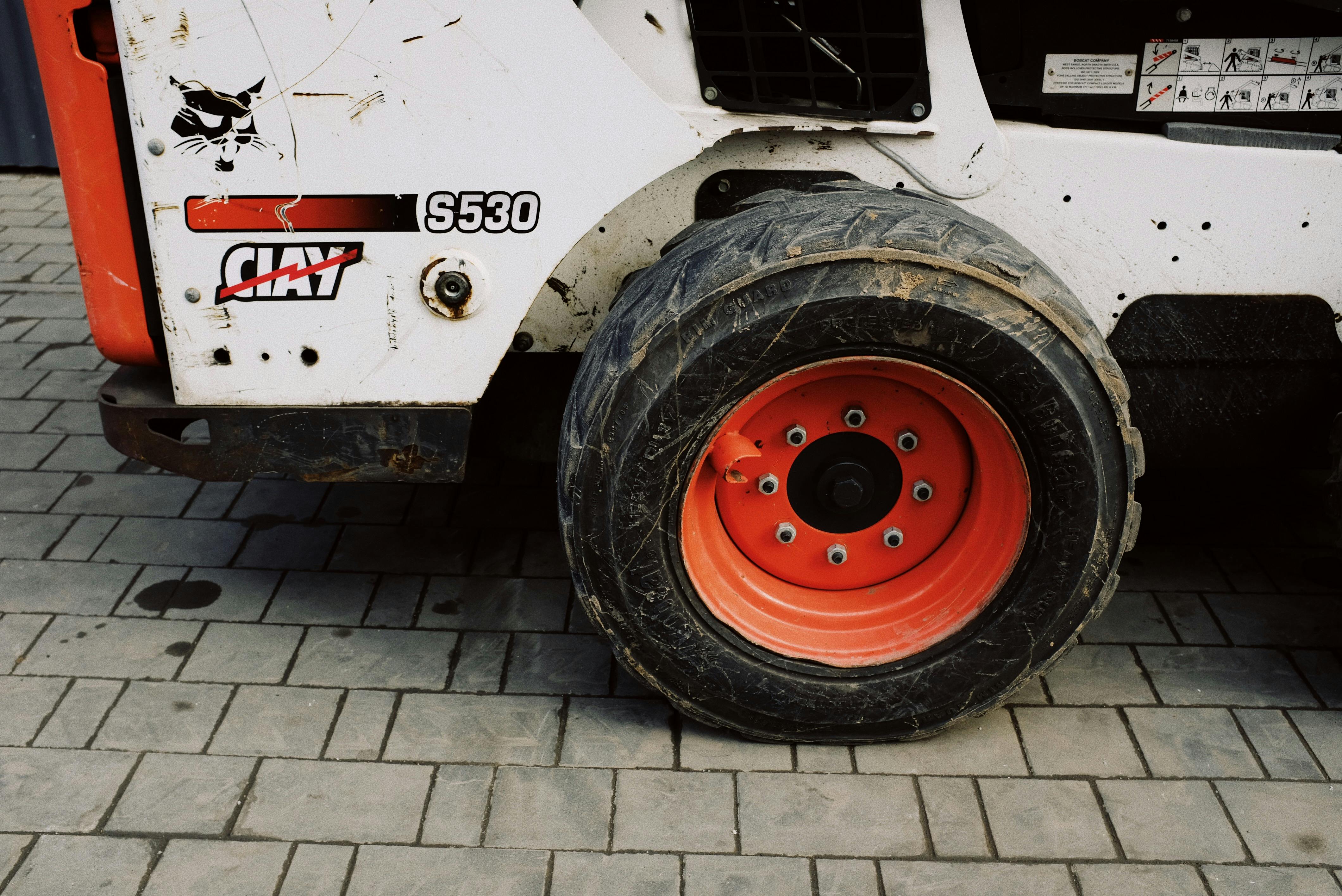 Wheels of small truck parked on pavement on street · Free Stock Photo