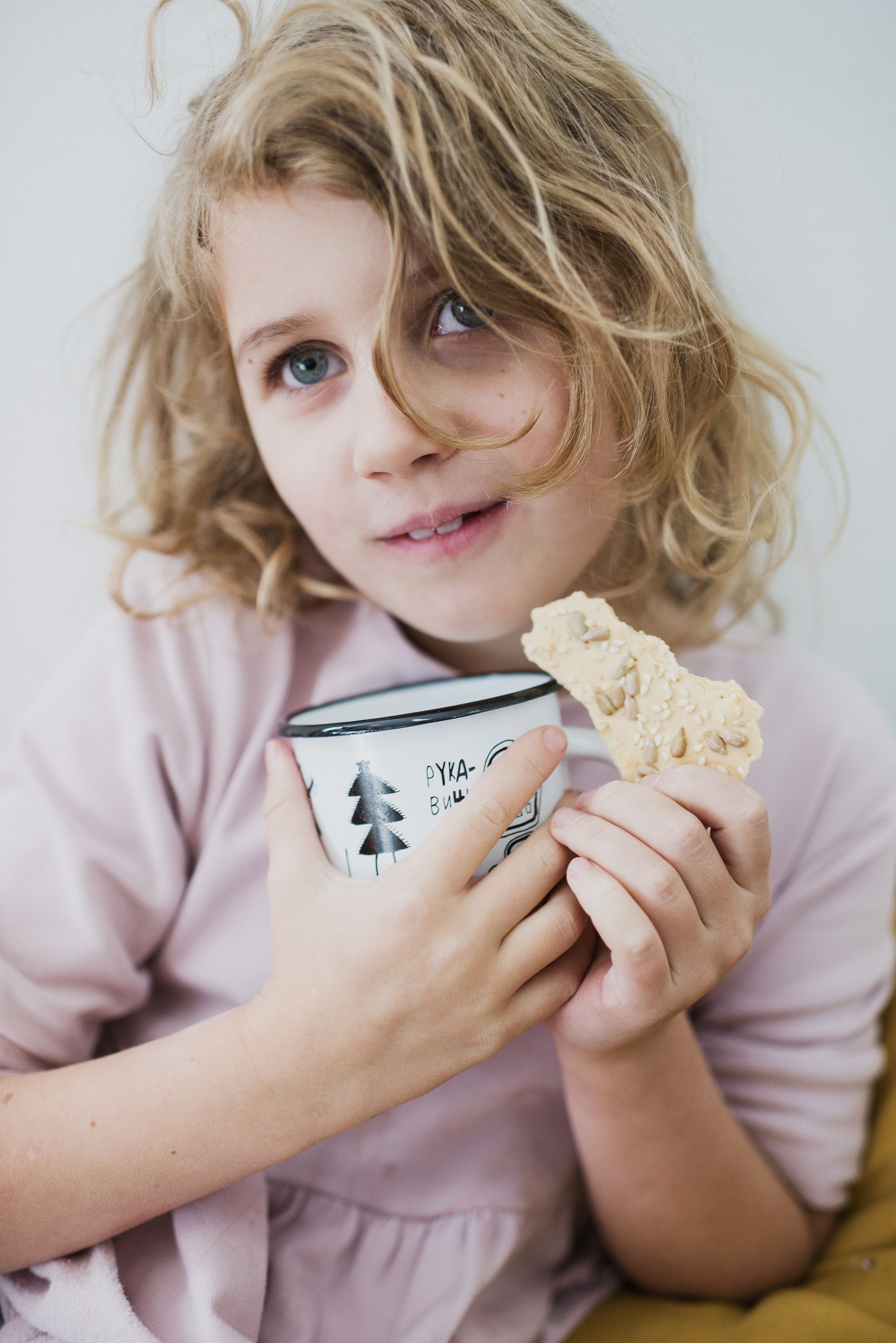 Girl Eating Biscuit and Milk · Free Stock Photo