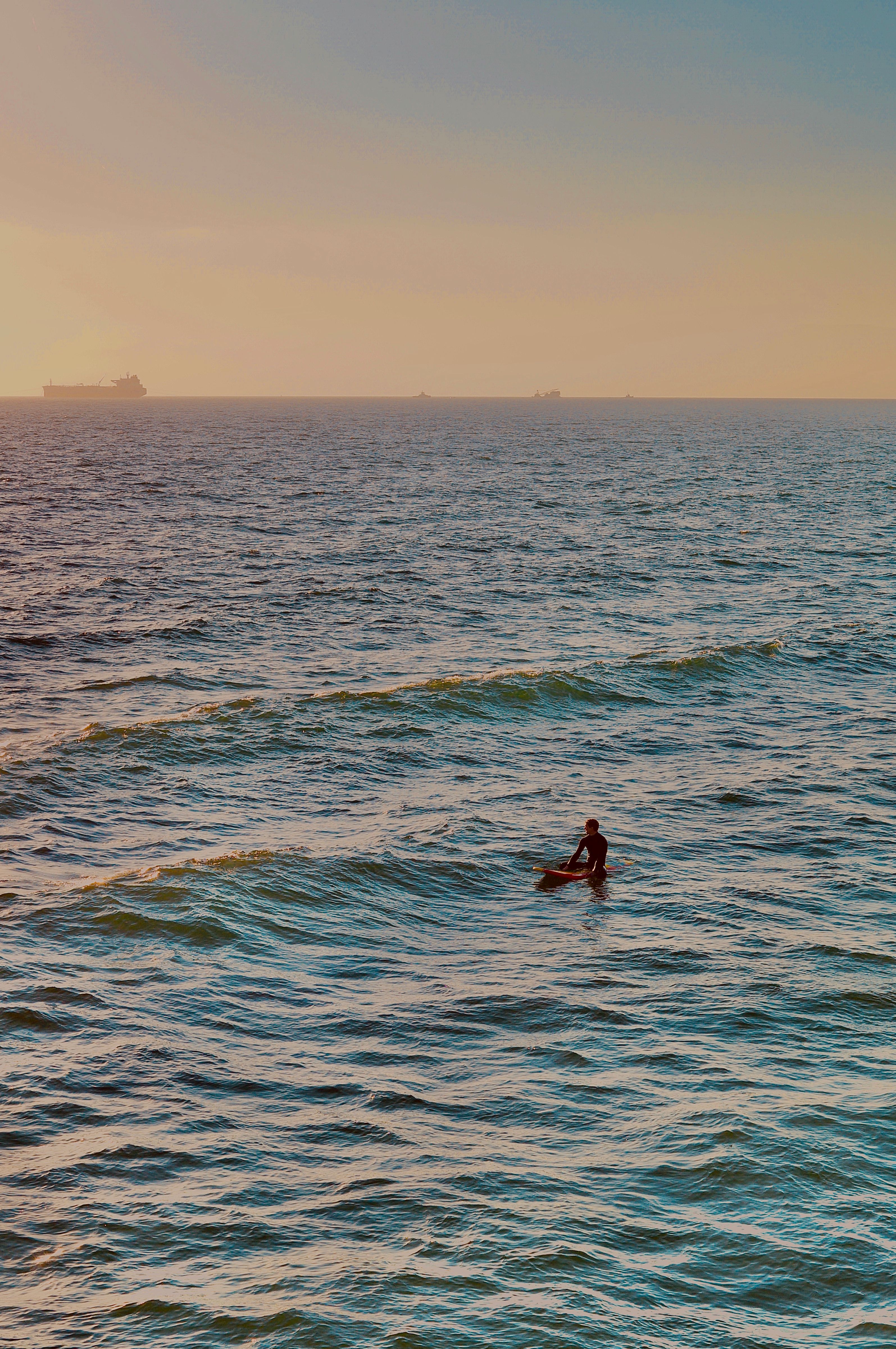 Man Standing on Sea Shore · Free Stock Photo
