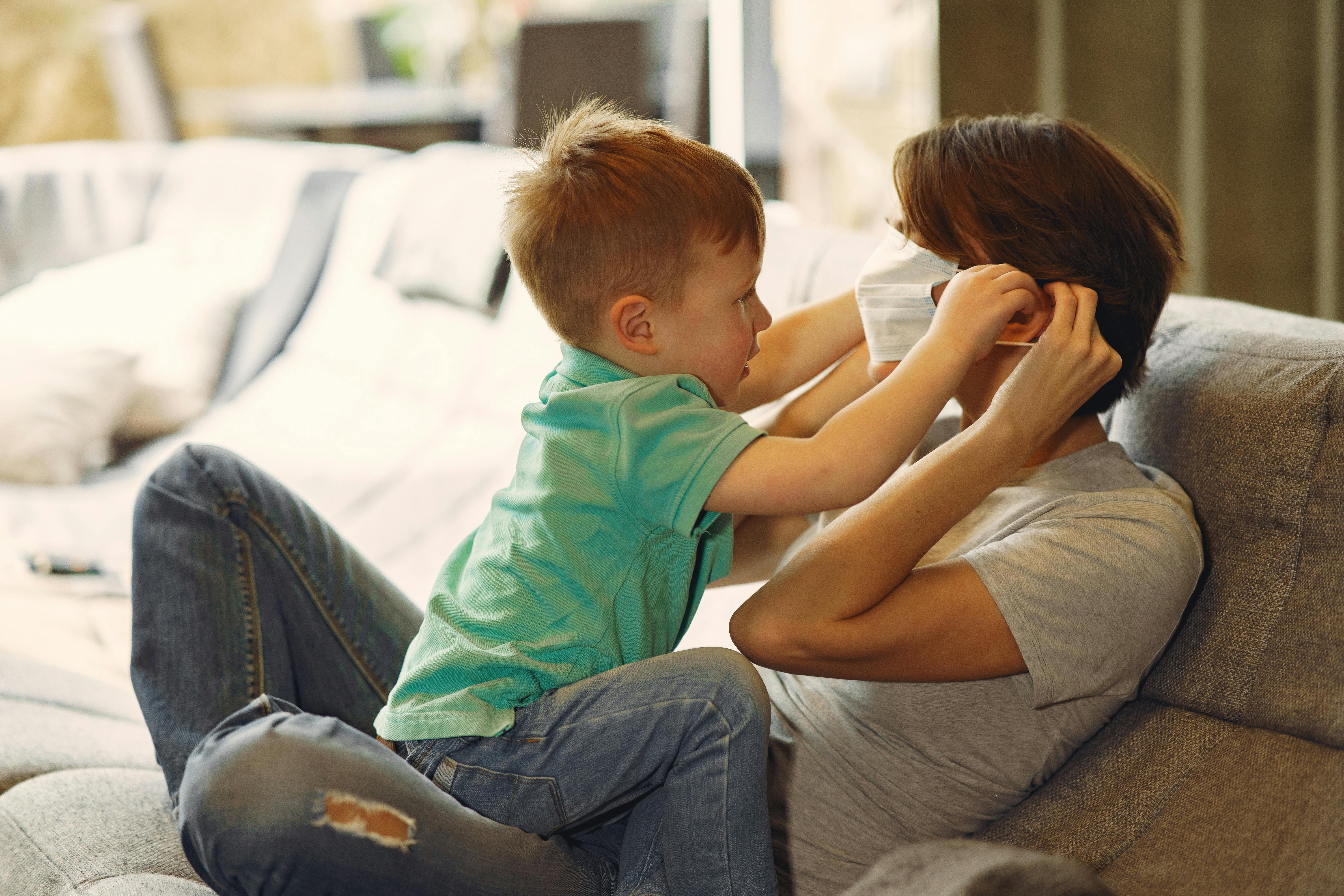 Boy in Green T-shirt and Gray Denim Jeans Sitting on Womans Lap · Free ...