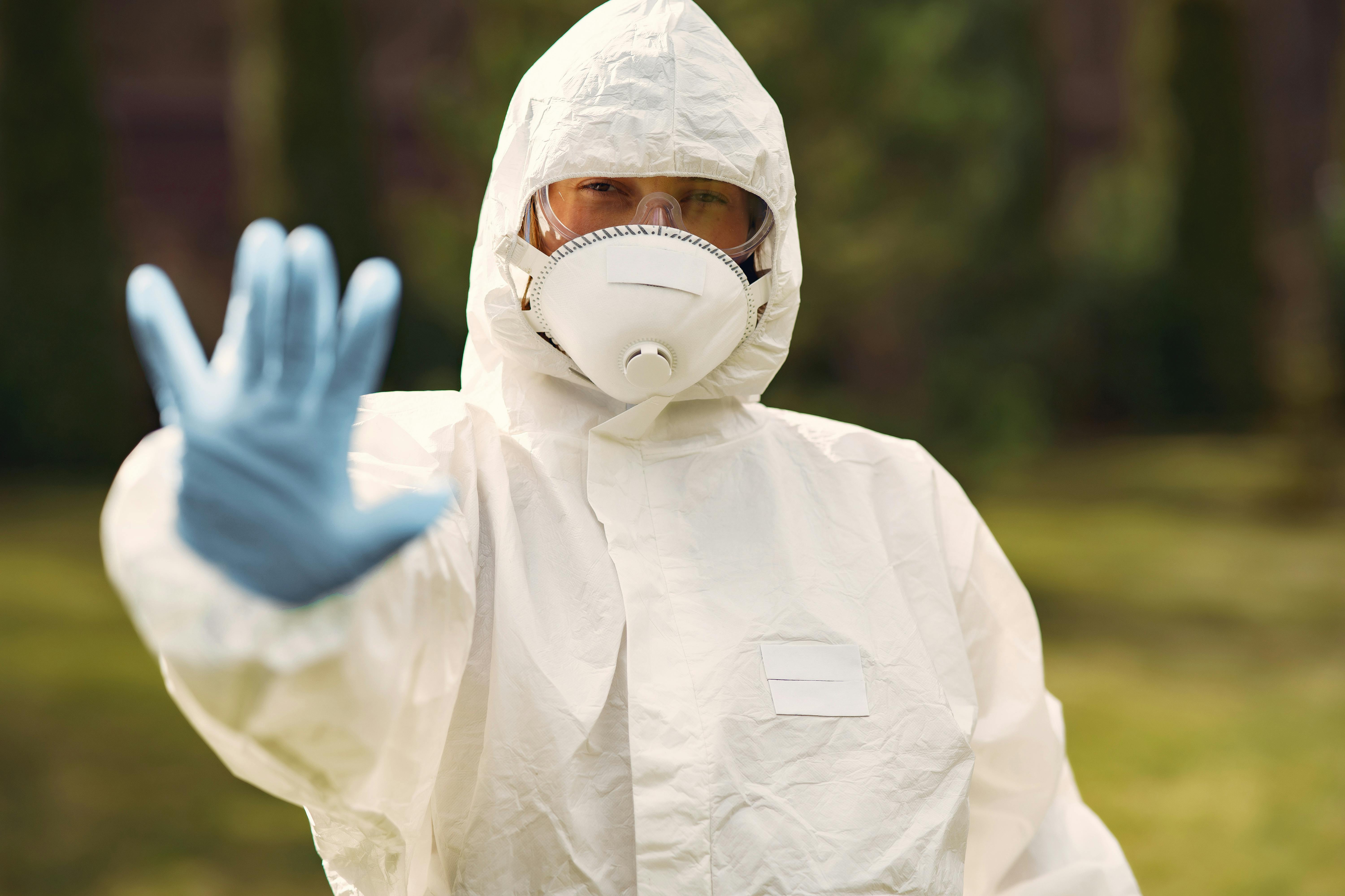 Person Wearing Protective Suit · Free Stock Photo
